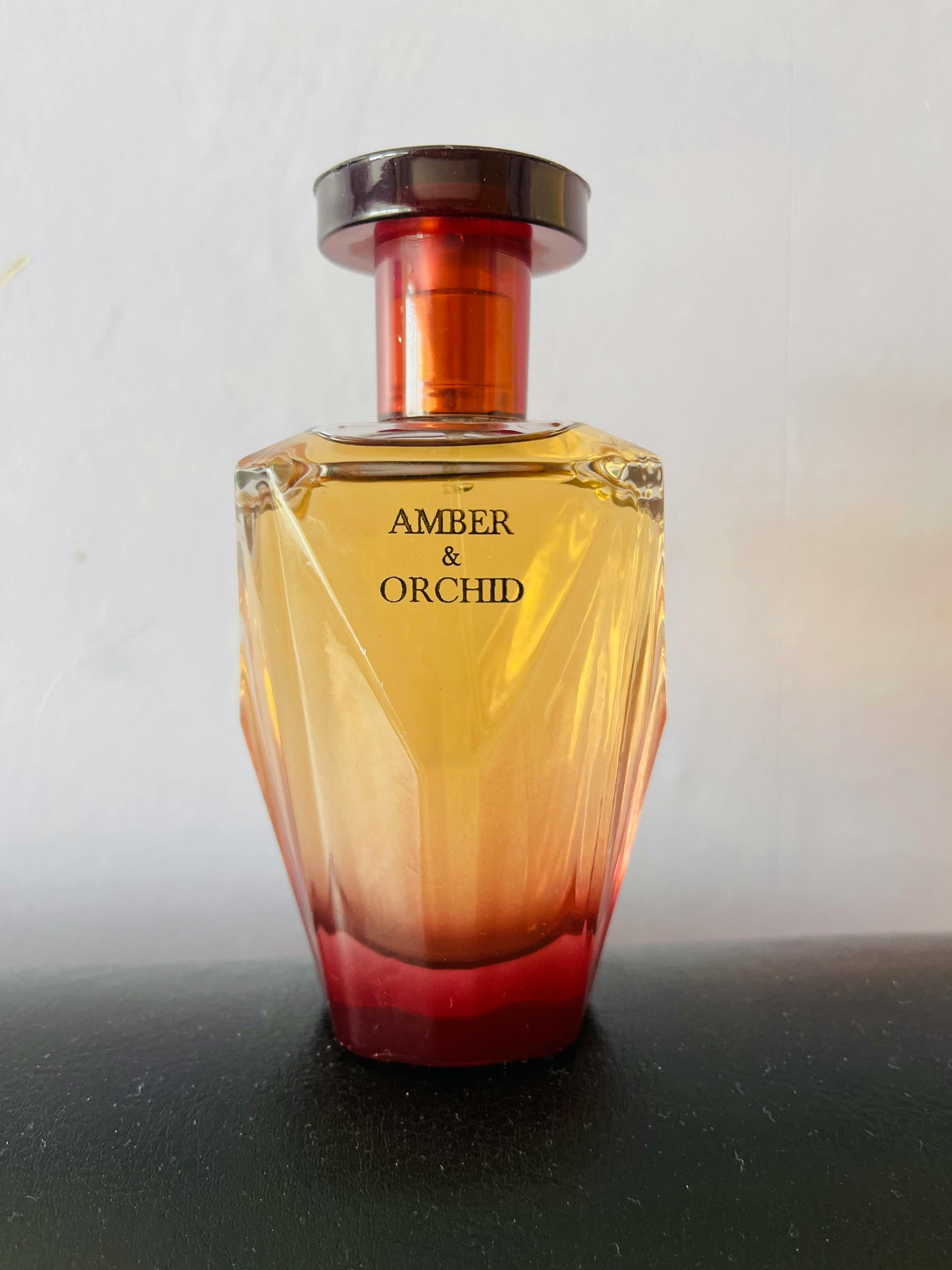 Brown Dried Leaf Beside Glass Perfume Bottle · Free Stock Photo