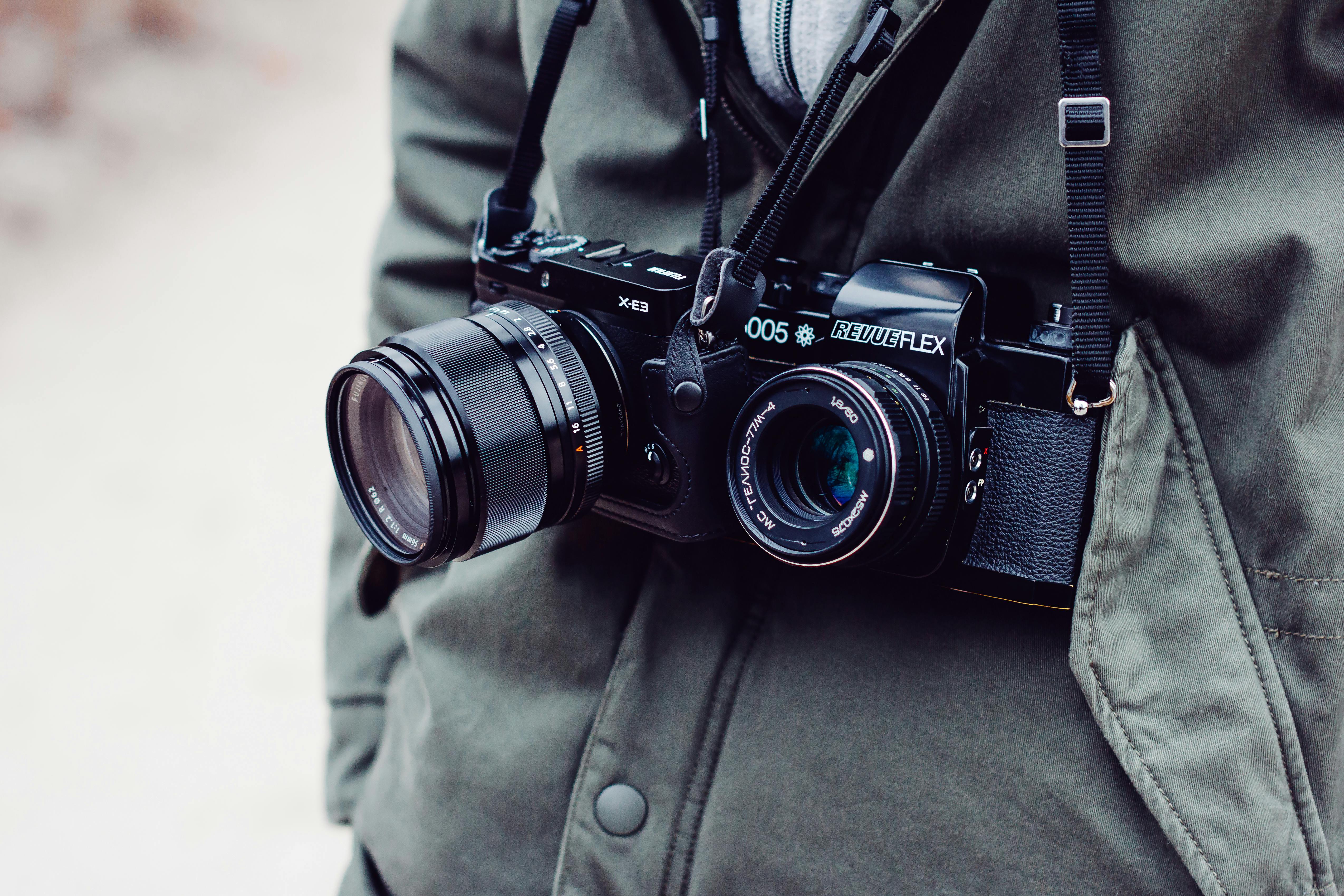 Two Black Bridge and Dslr Cameras · Free Stock Photo