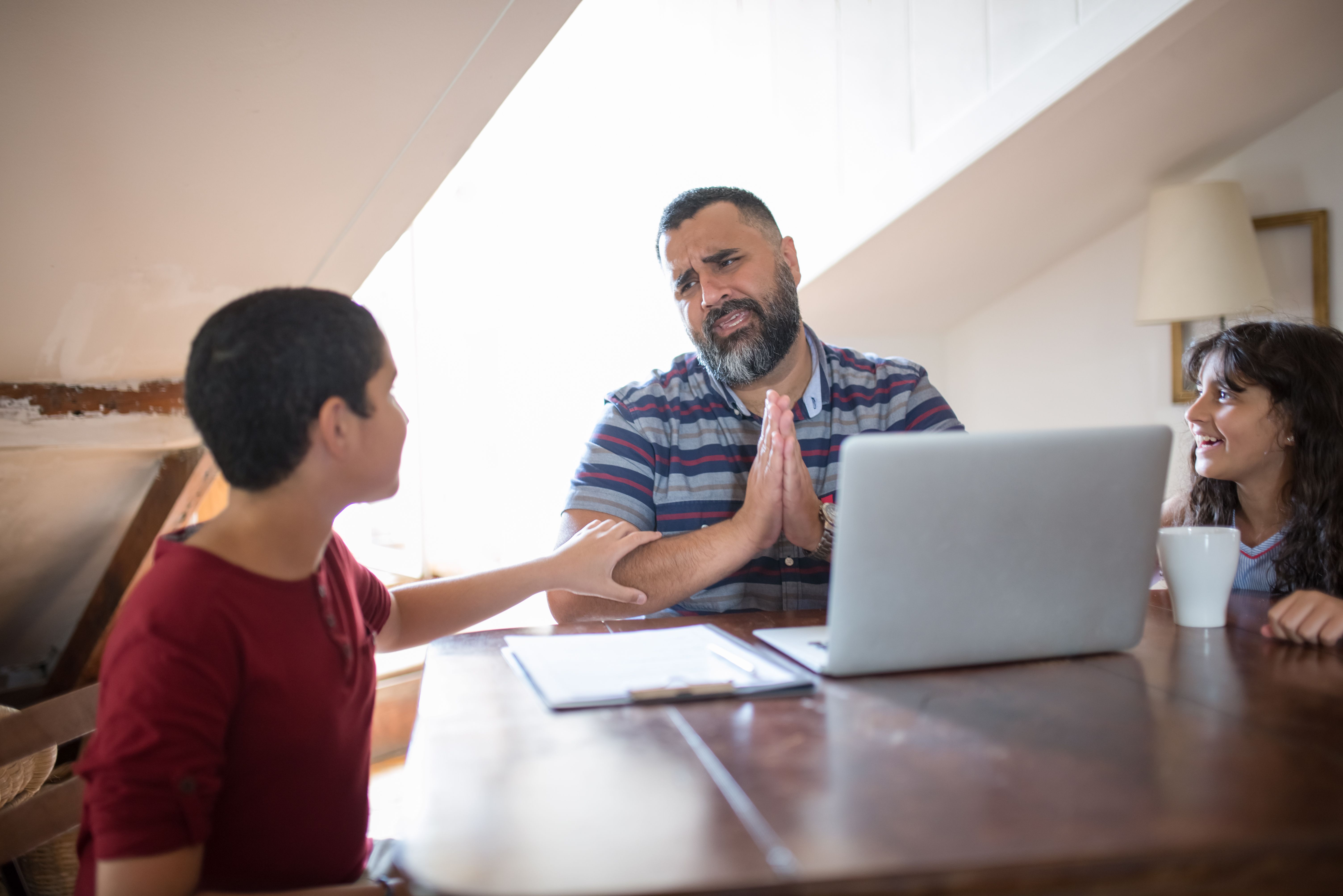 Father Talking with His Children While Doing a Hand Gesture · Free ...