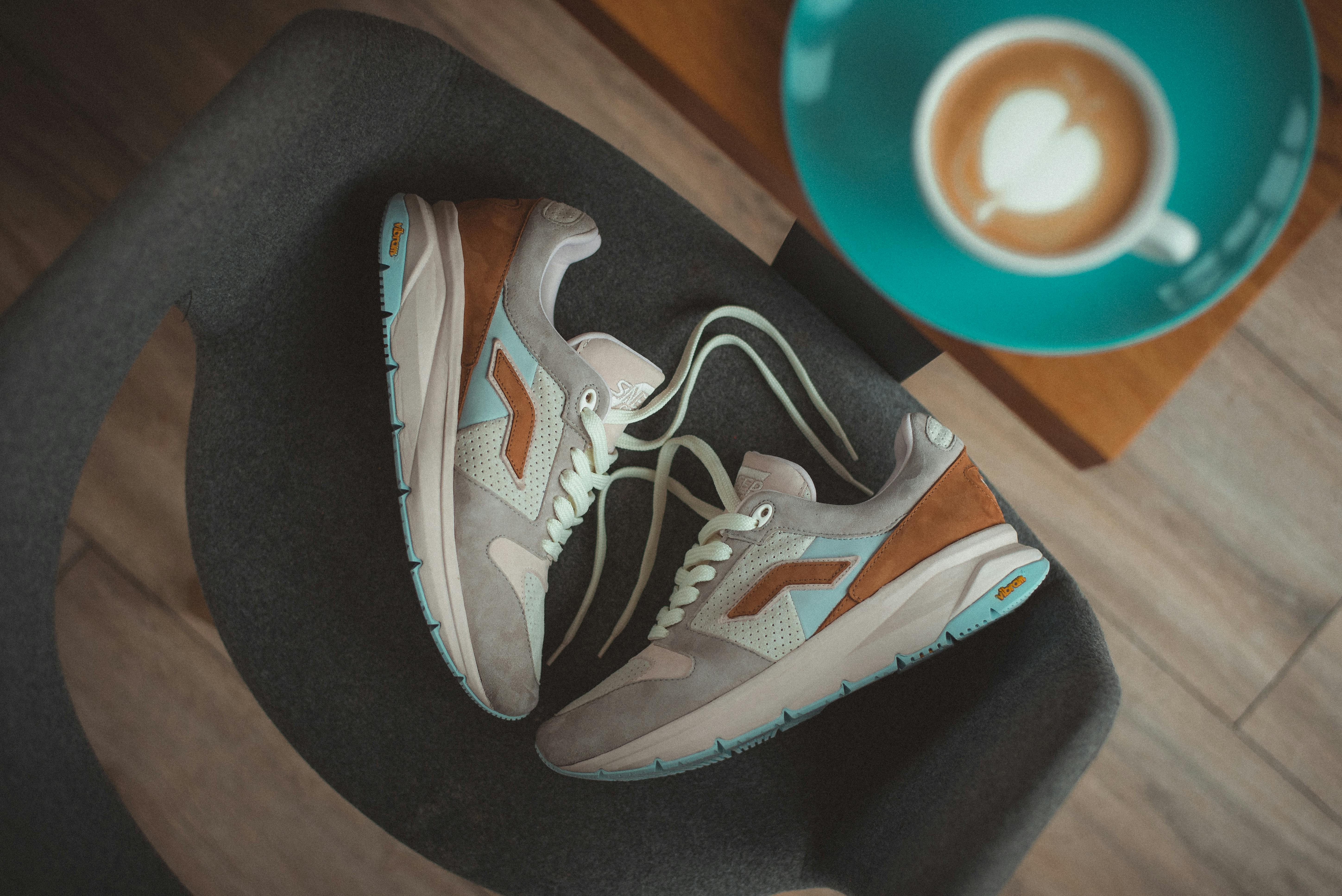 Overhead Shot of Sneep Crew Sneakers on an Armchair · Free Stock Photo