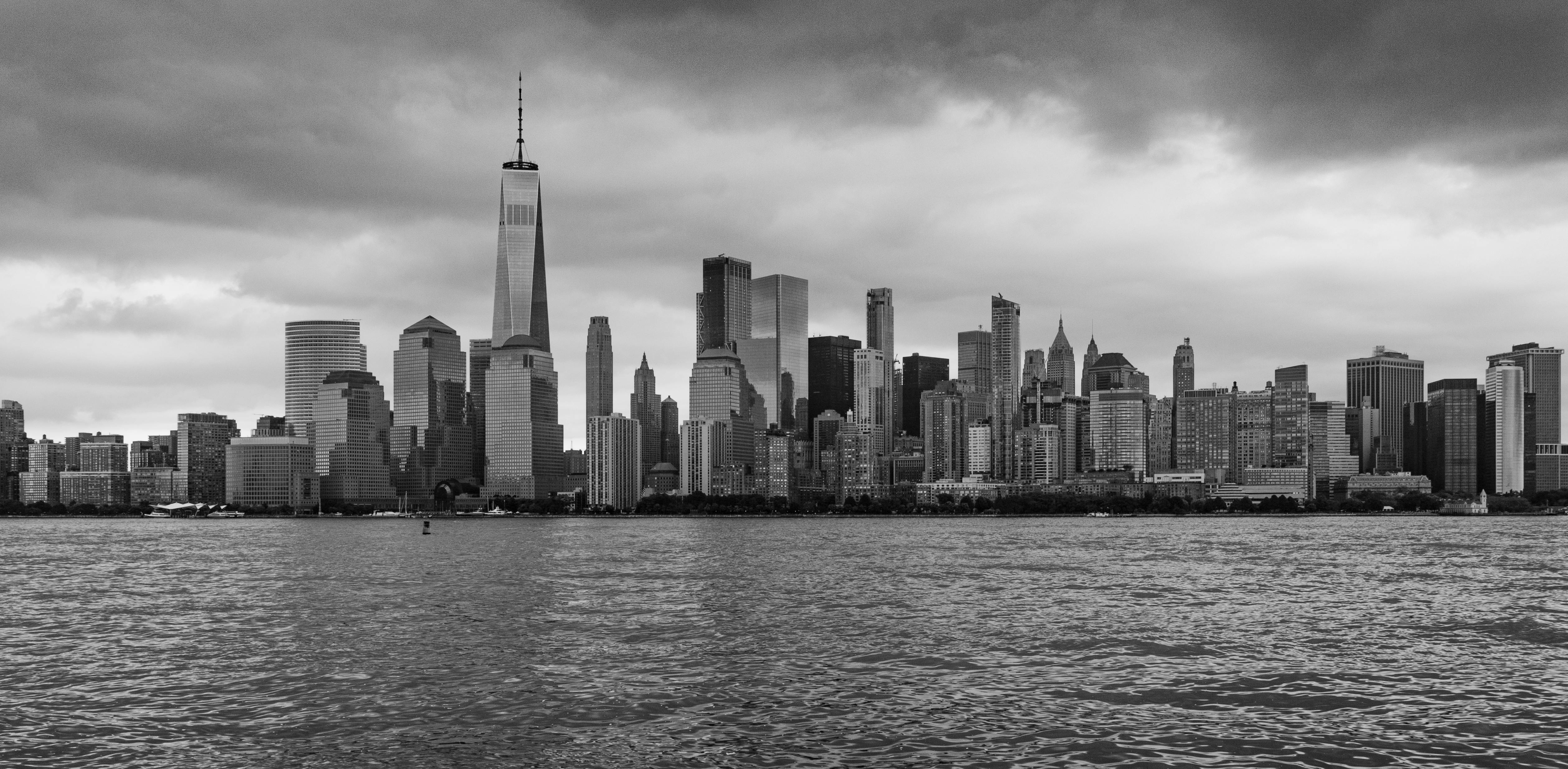 Grayscale Photo of City Skyline · Free Stock Photo