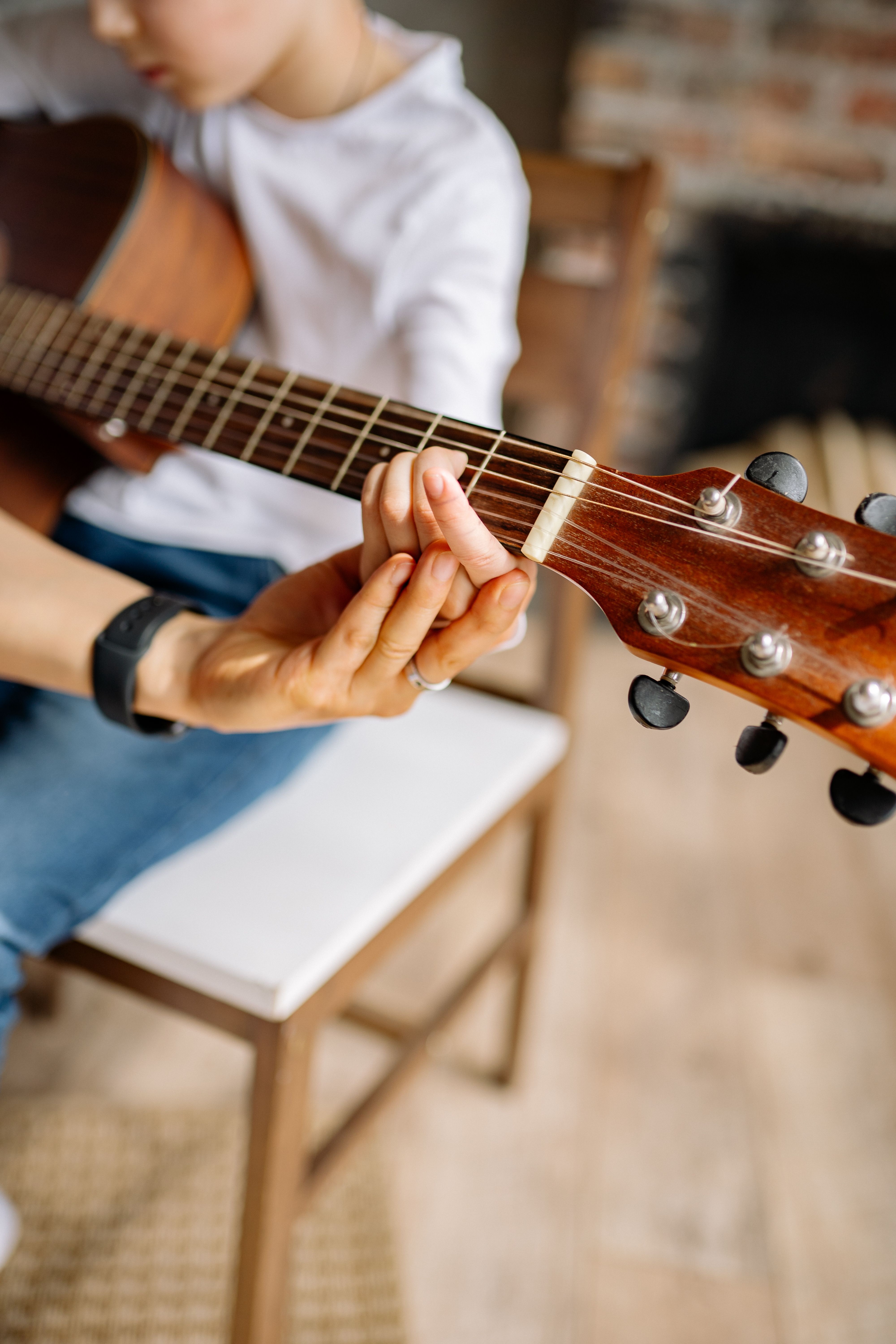 Person Playing Acoustic Guitar · Free Stock Photo