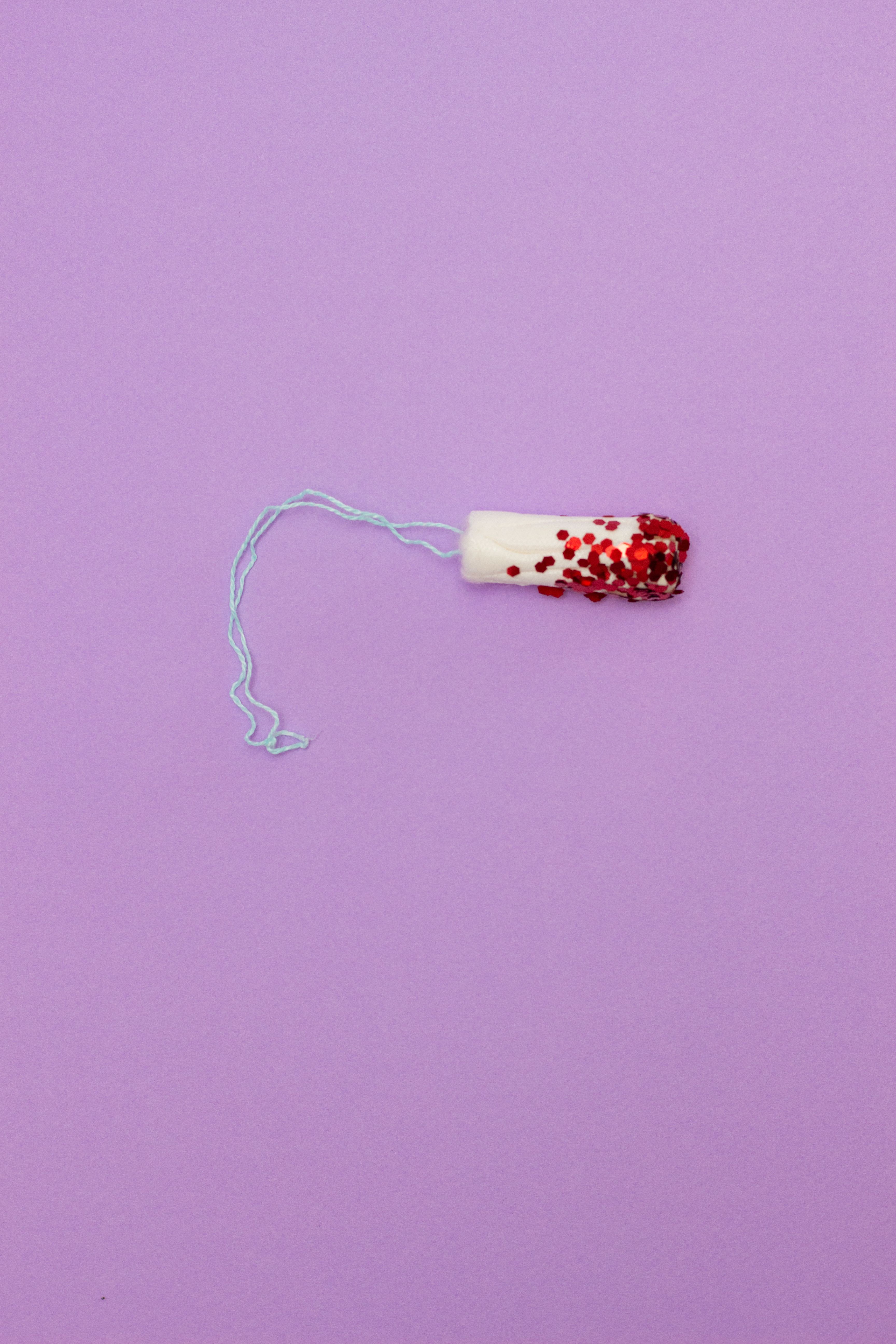A Tampon with Red Sequins · Free Stock Photo