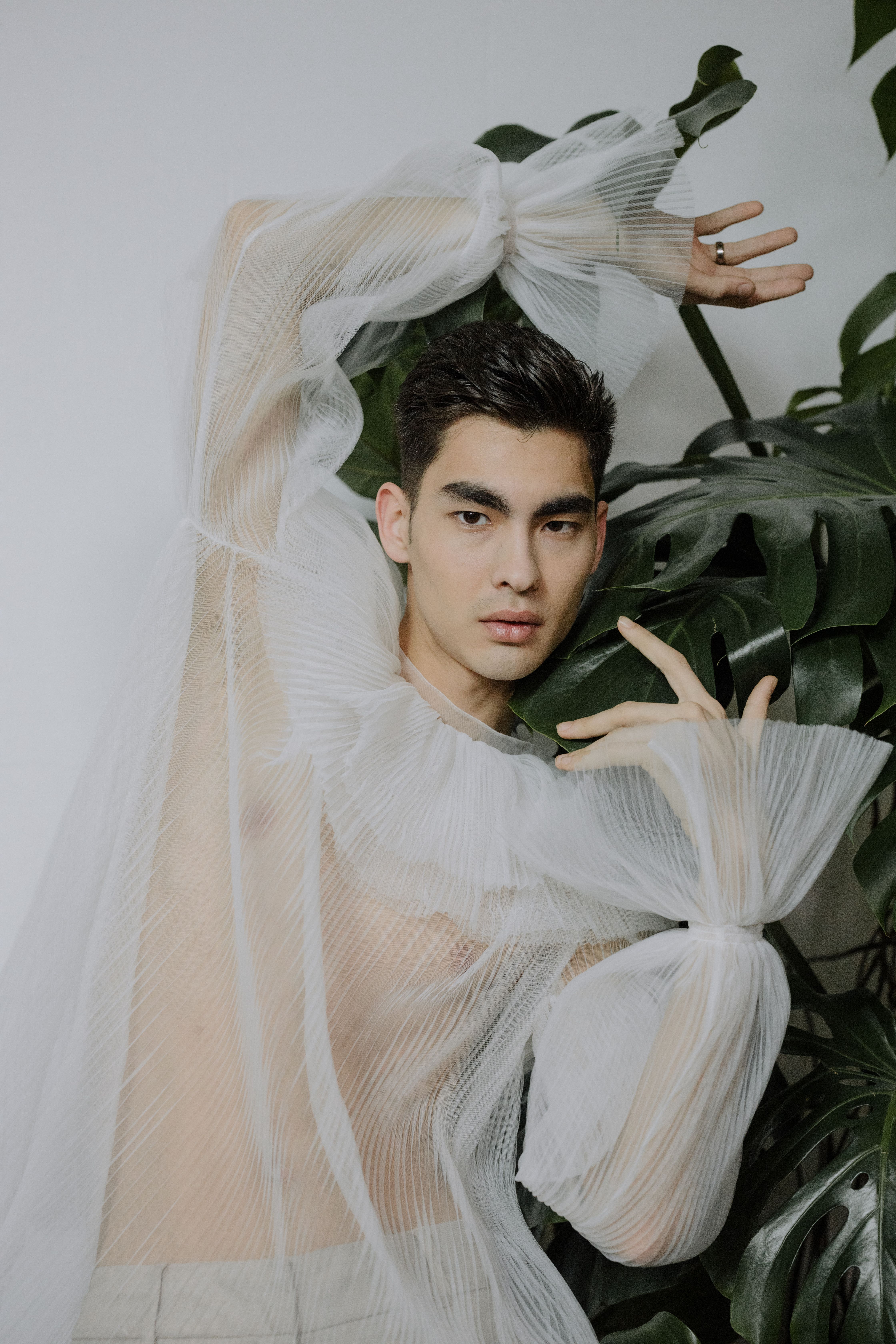 Man Wearing a Sheer White Top · Free Stock Photo