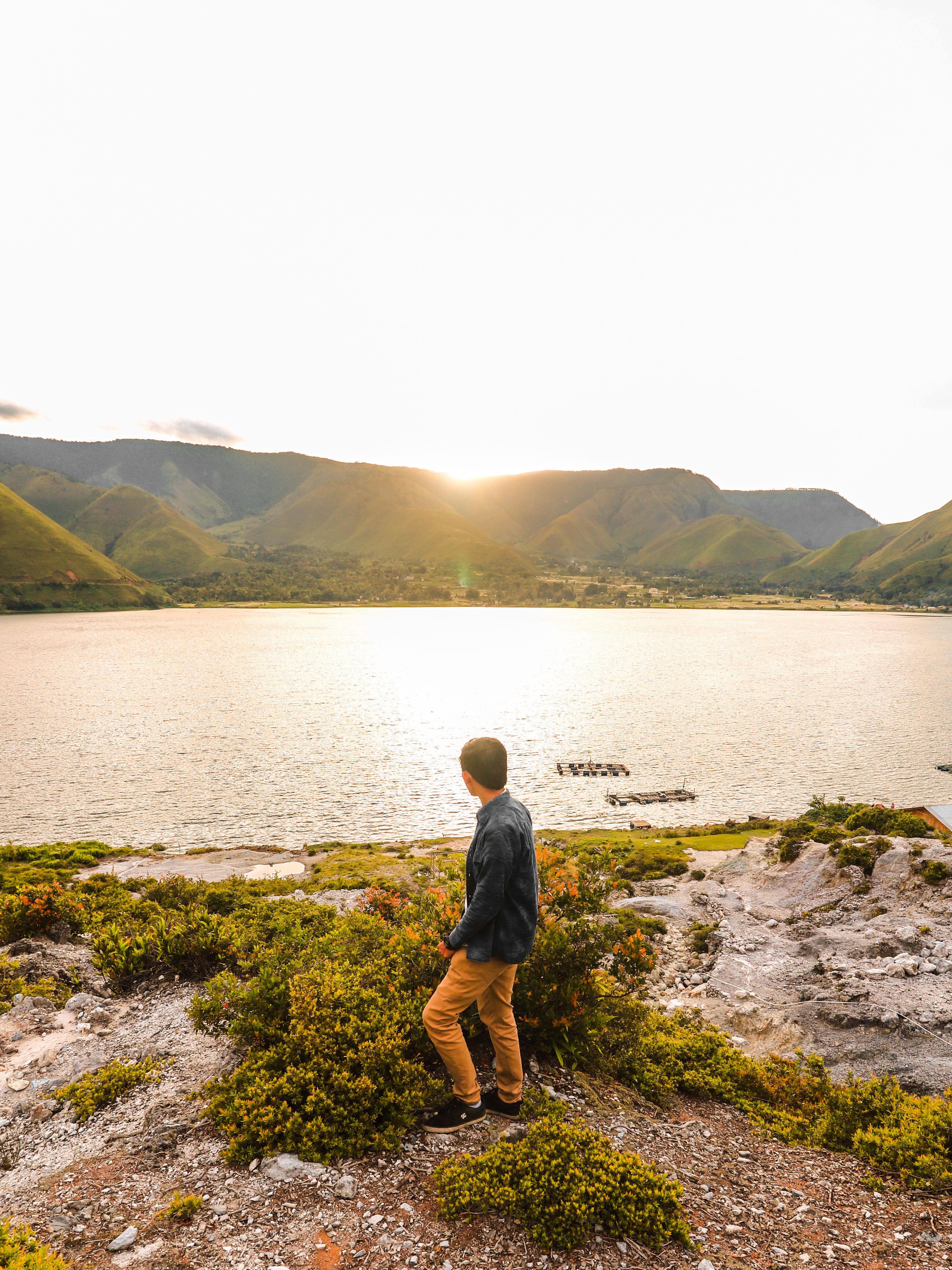 Person Near Body Of Water · Free Stock Photo