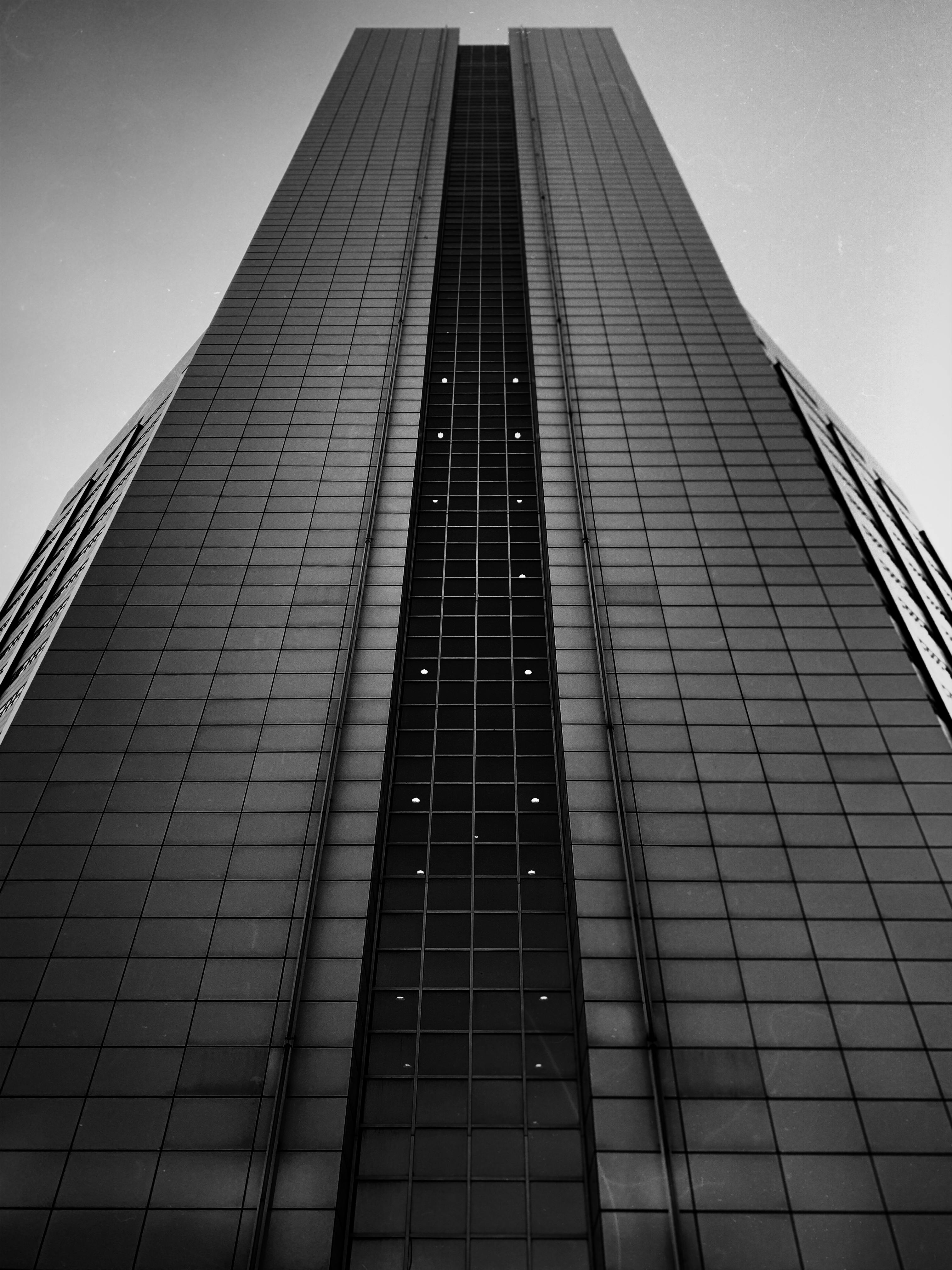 Grayscale Photo of High Rise Building · Free Stock Photo