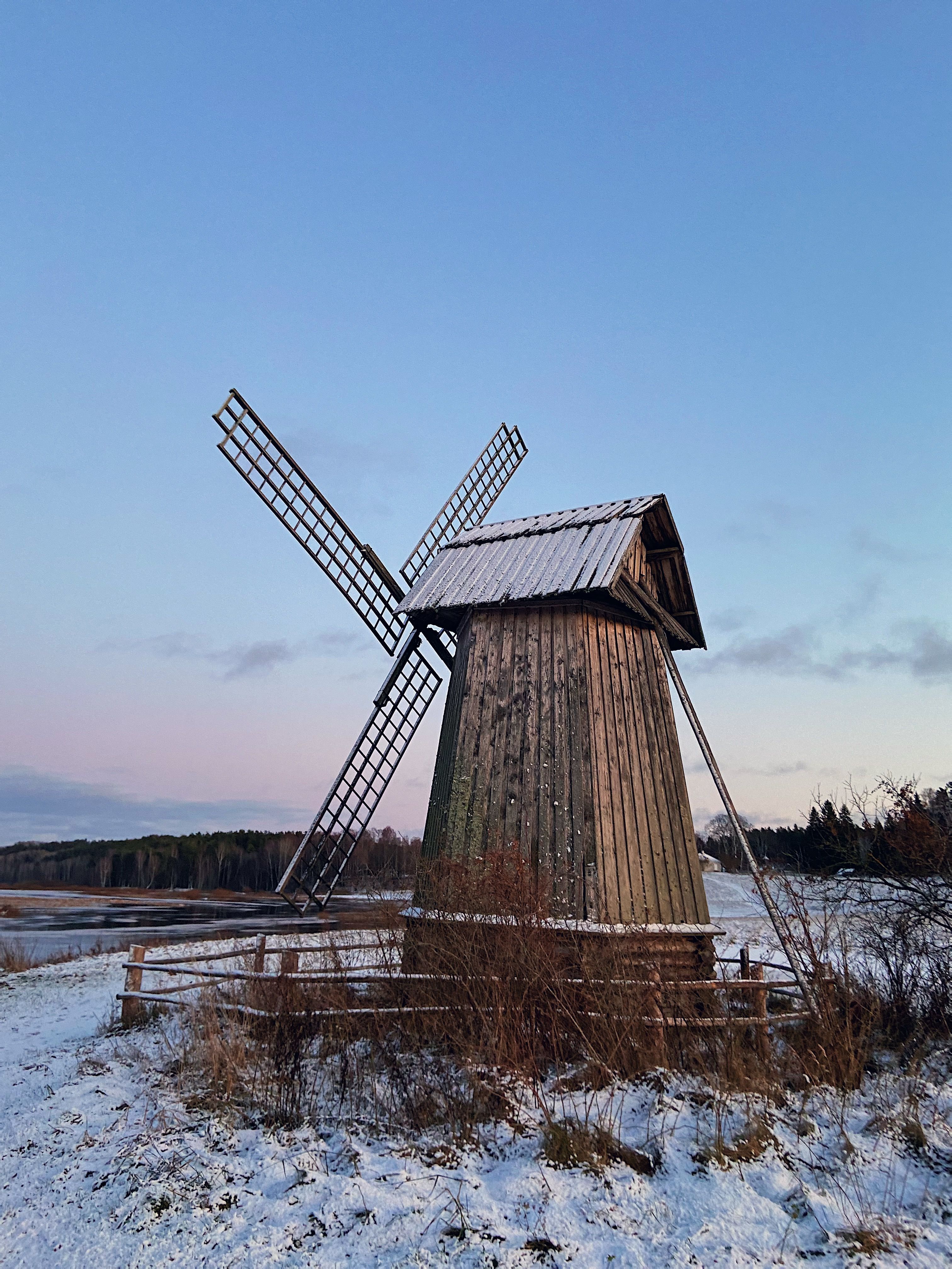 Brown Wooden Windmill Under Blue Sky · Free Stock Photo