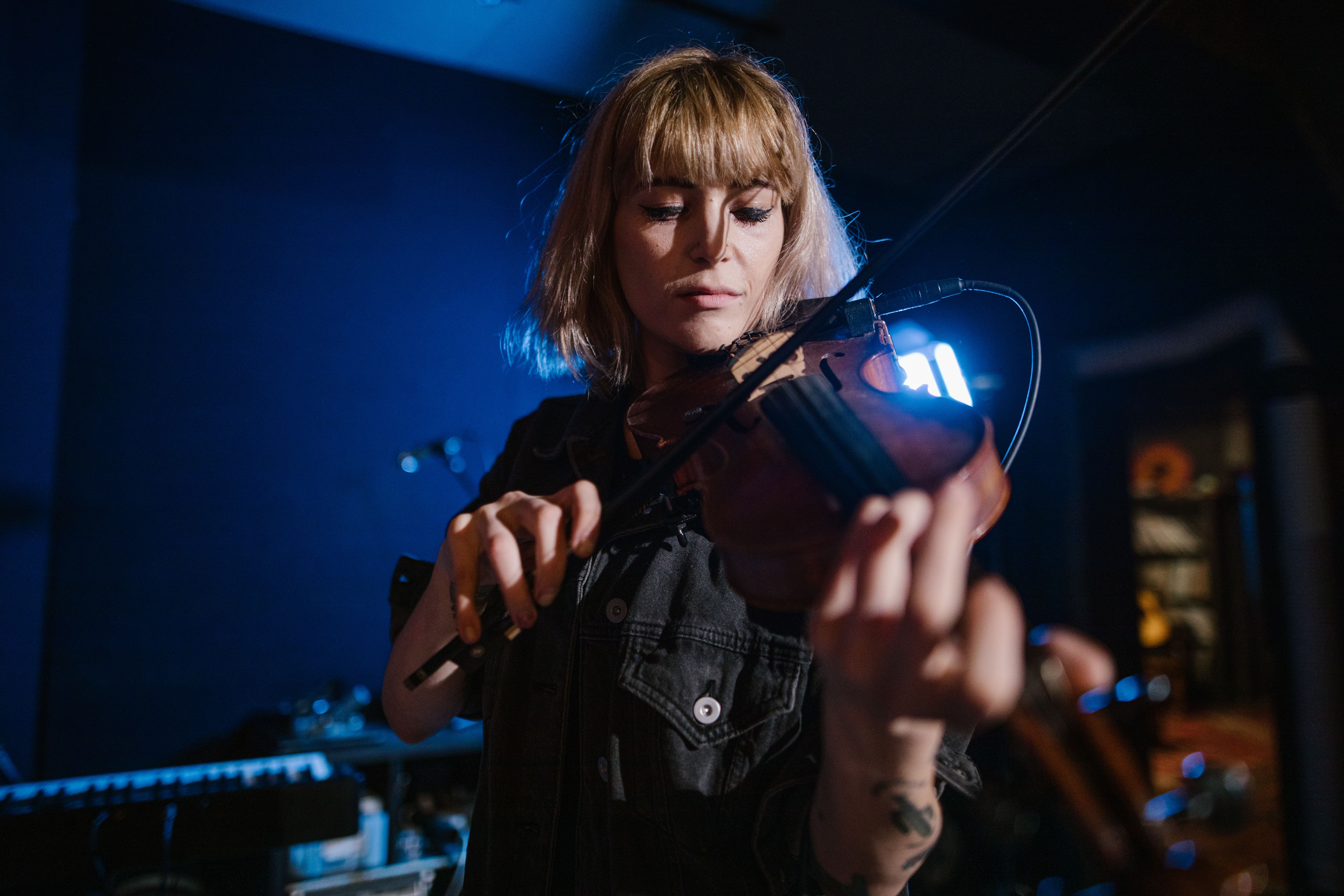 Woman in Black Jacket Holding Violin · Free Stock Photo