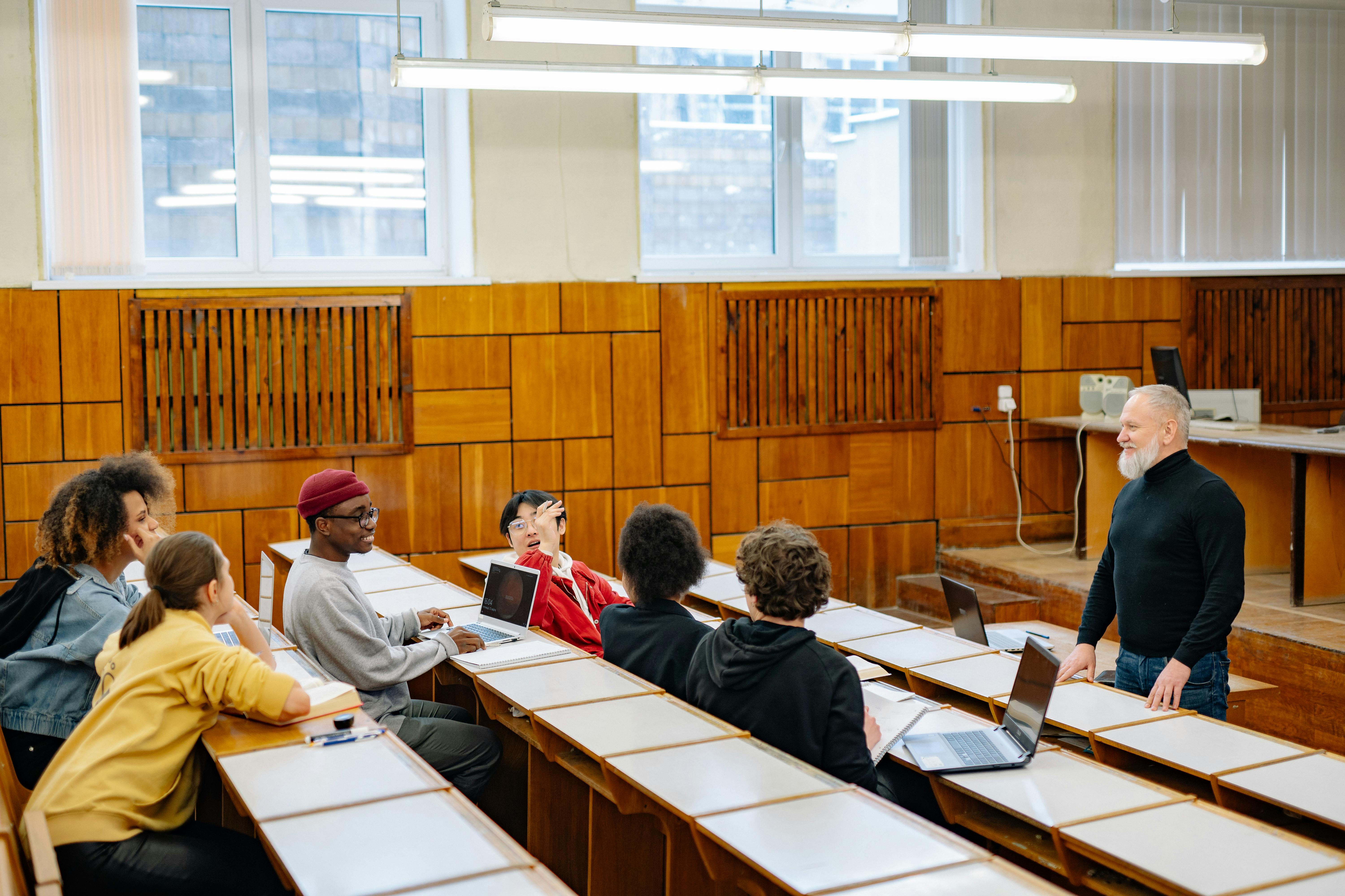 Professor Standing in Front of his Students · Free Stock Photo