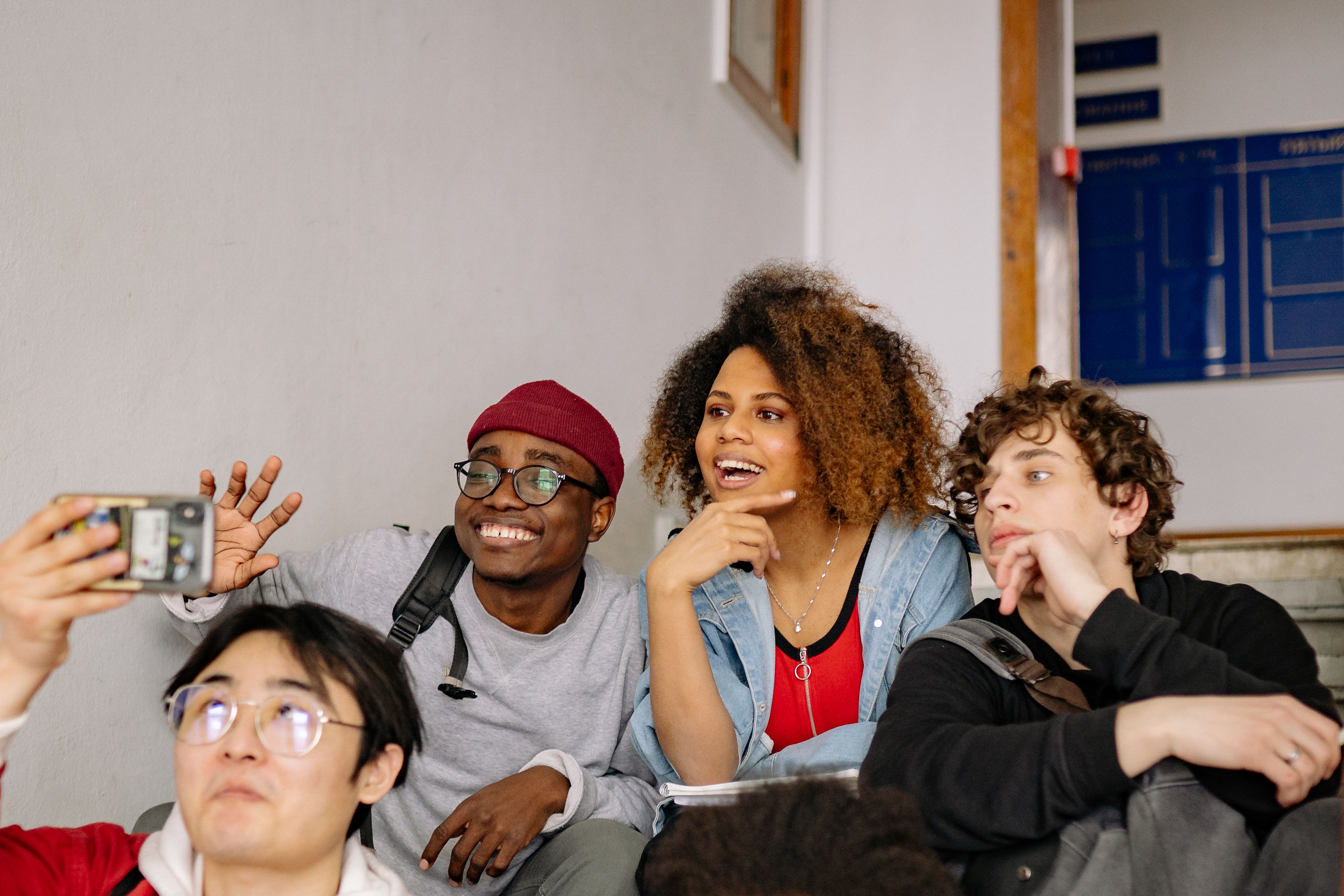 Photo of a Group of Friends Taking a Groupie · Free Stock Photo
