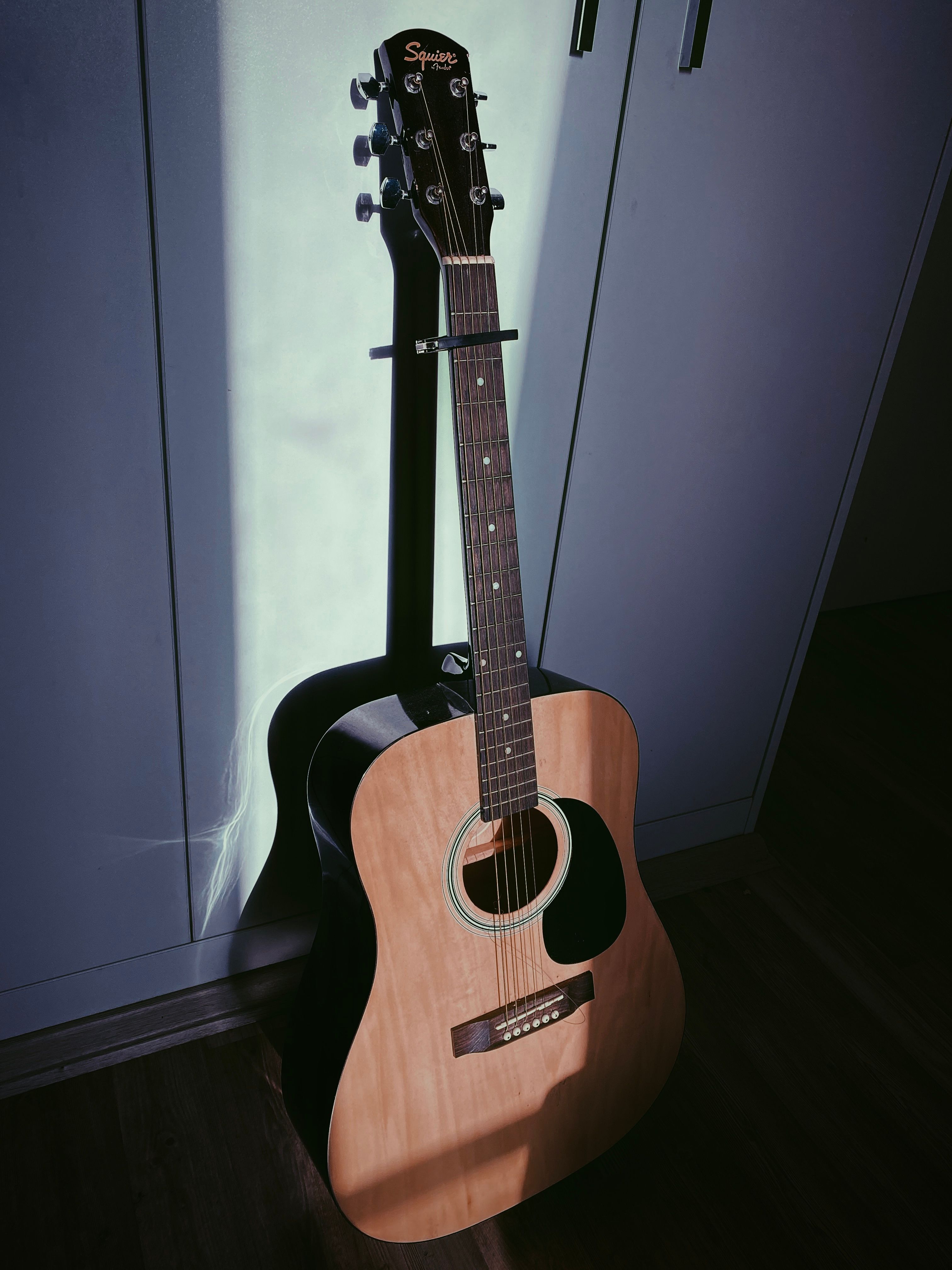 Close-Up Shot of an Acoustic Guitar · Free Stock Photo