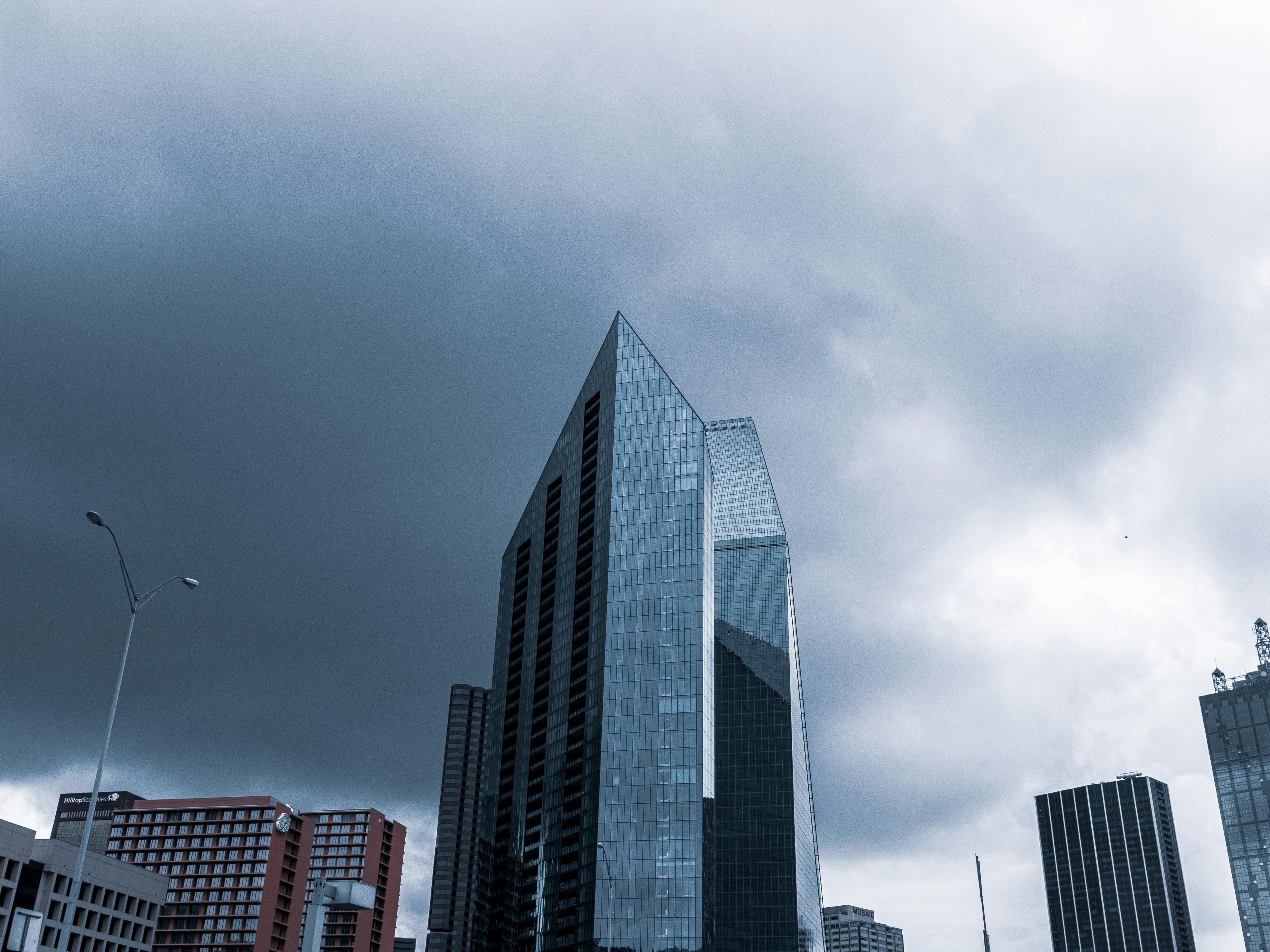 Beige Concrete Building Under Blue Sky Painting · Free Stock Photo