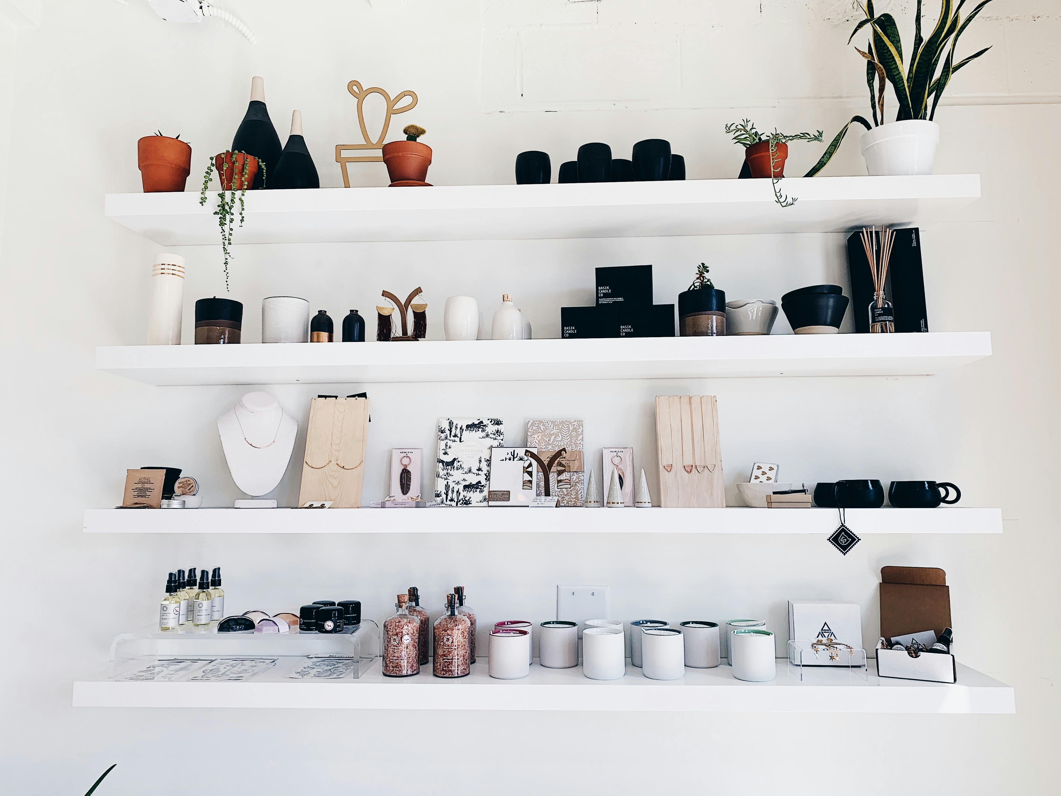 Shelves Full of Trinkets, Candles and Pots · Free Stock Photo