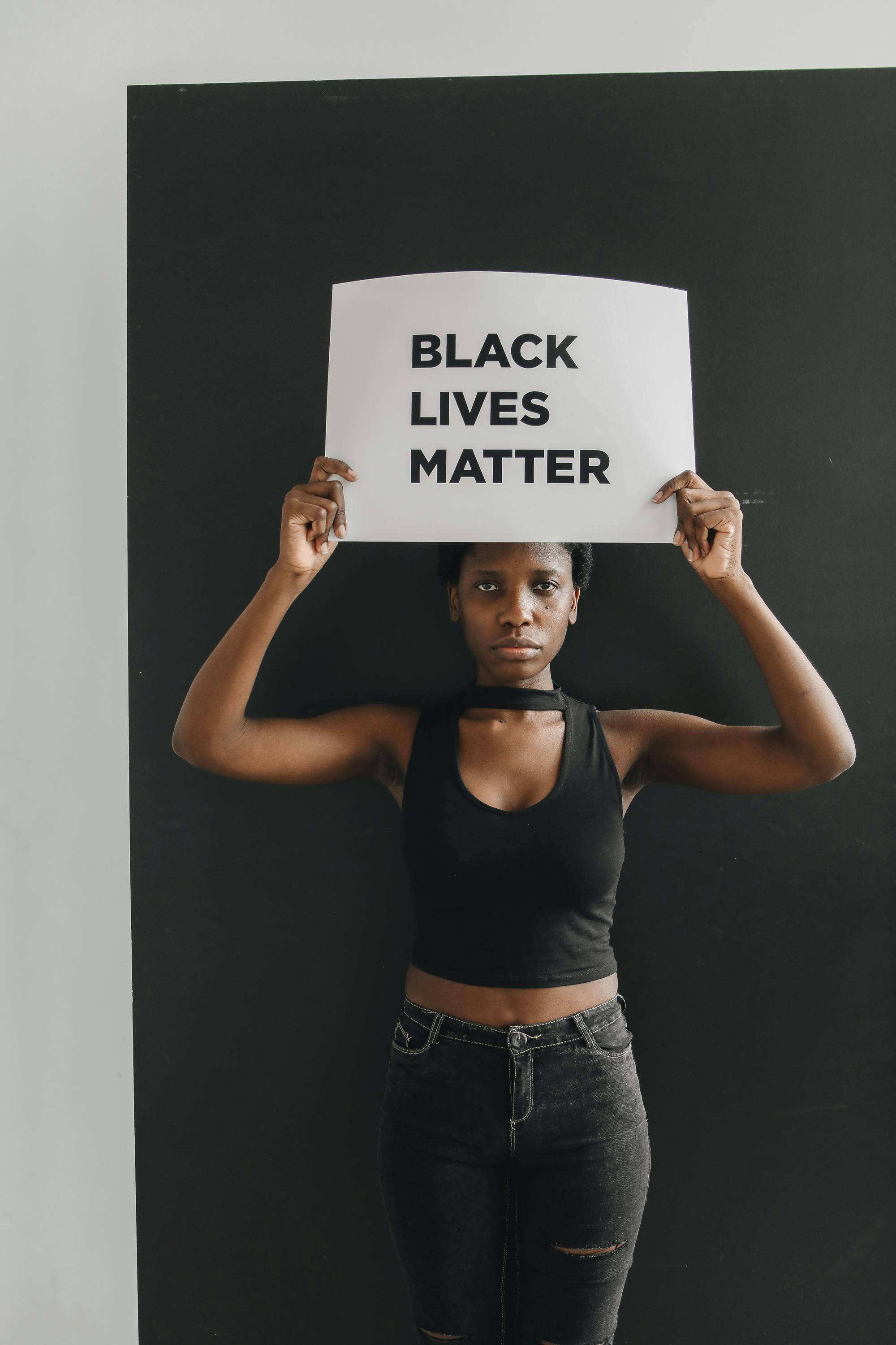 Woman Holding a Signage · Free Stock Photo
