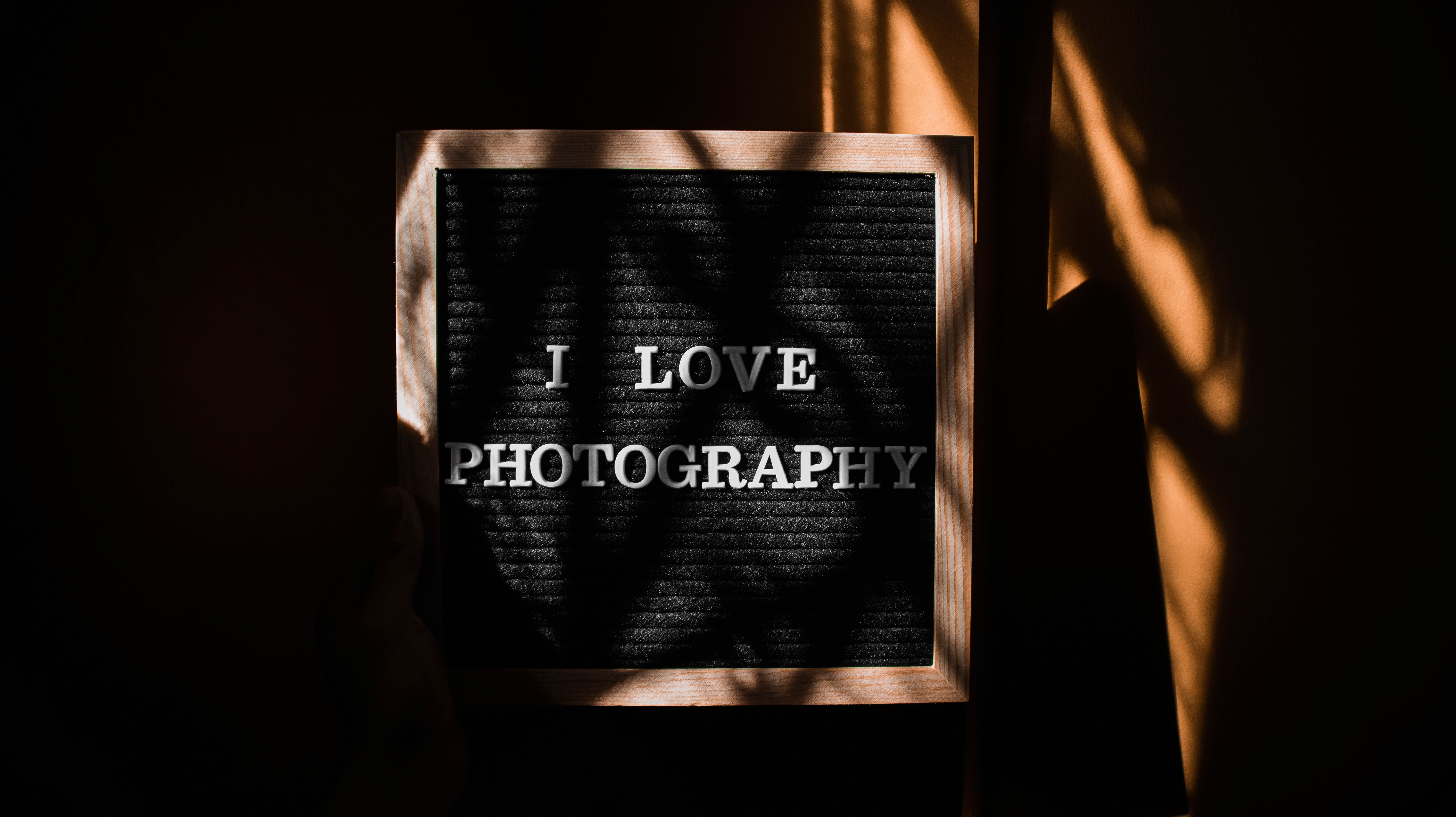 Close-Up Shot of I Love Photography Text in a Wooden Frame · Free Stock ...