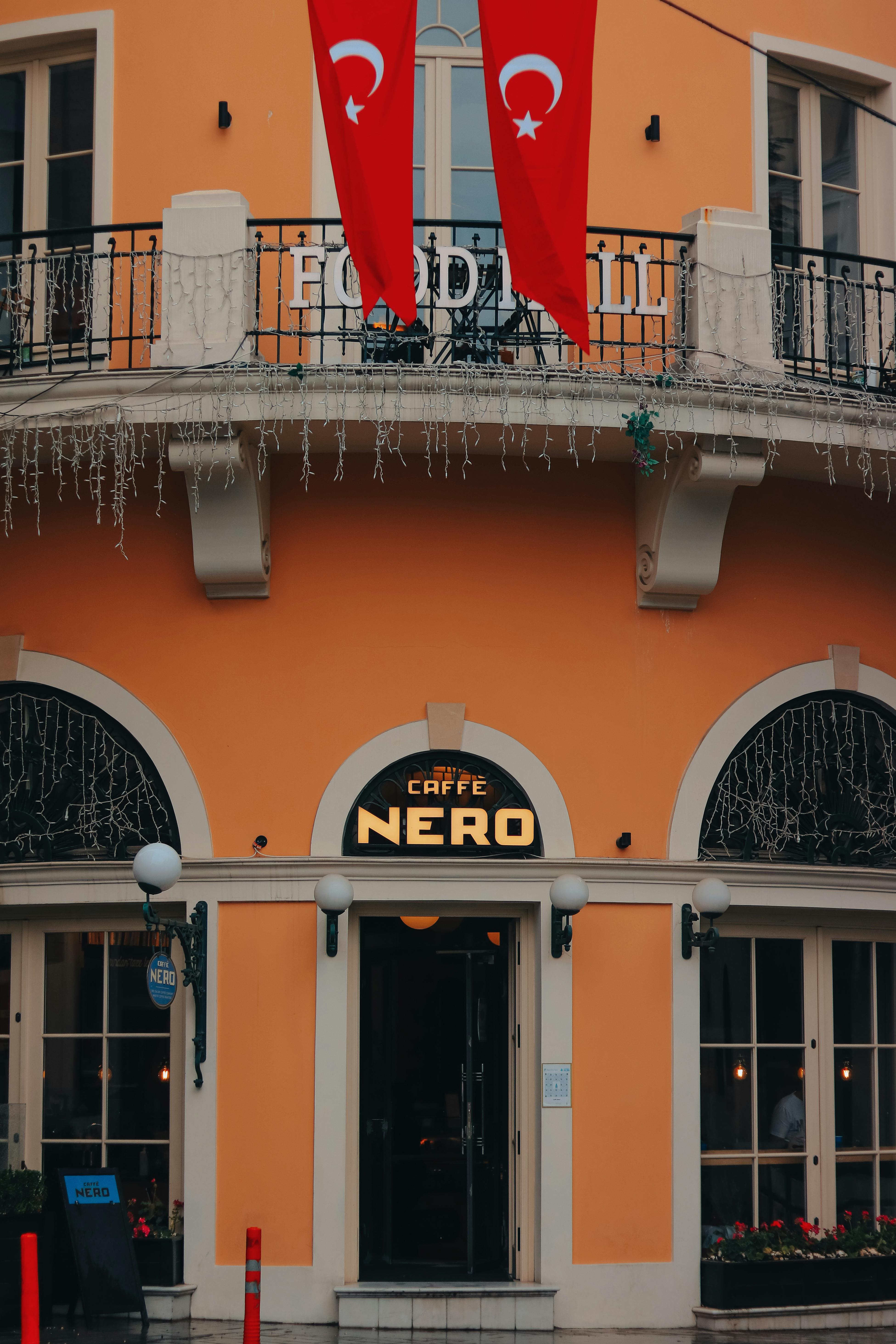 Flags of Turkey Hanging Outside Cafe Nero · Free Stock Photo