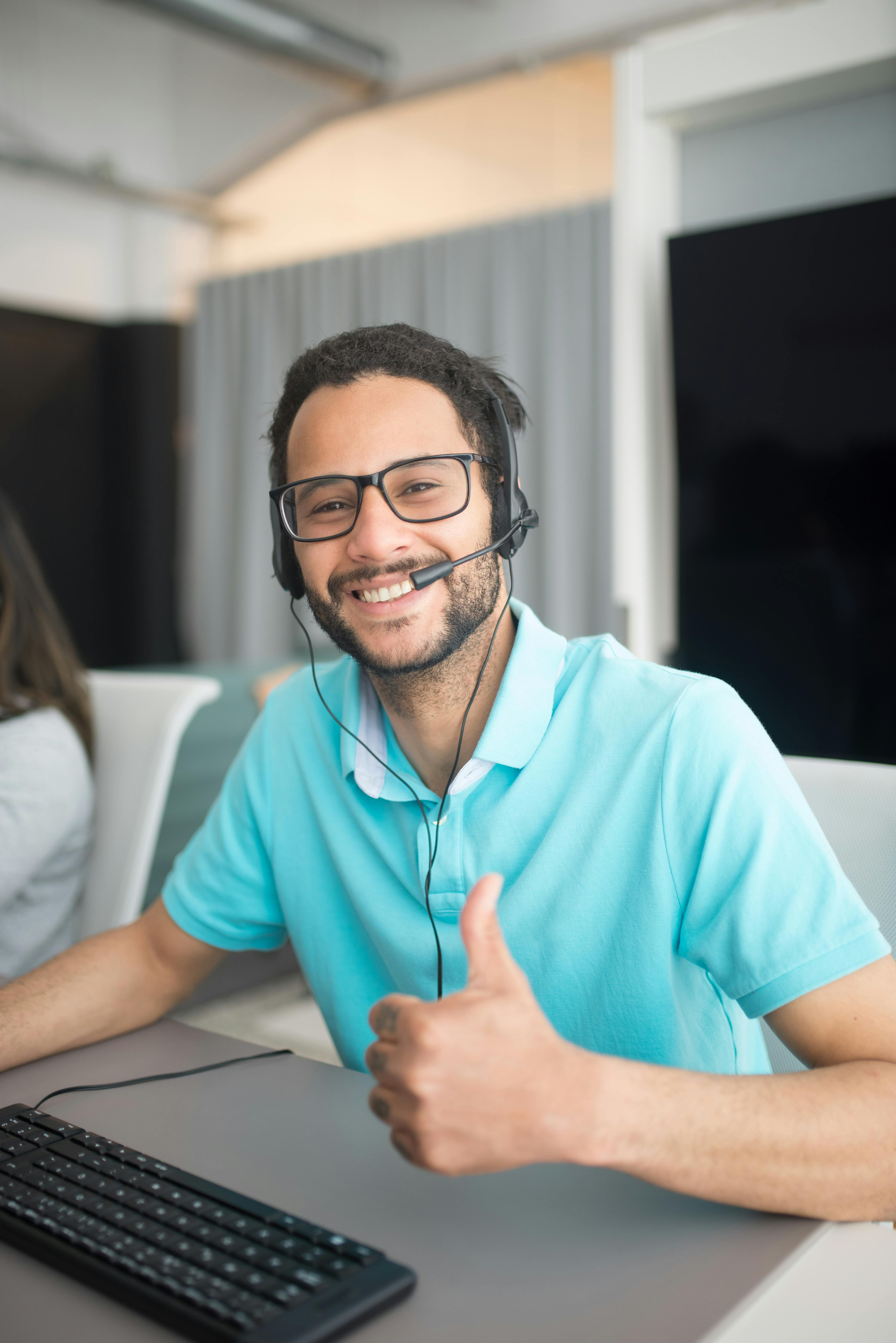 A Man Working in the Call Center · Free Stock Photo