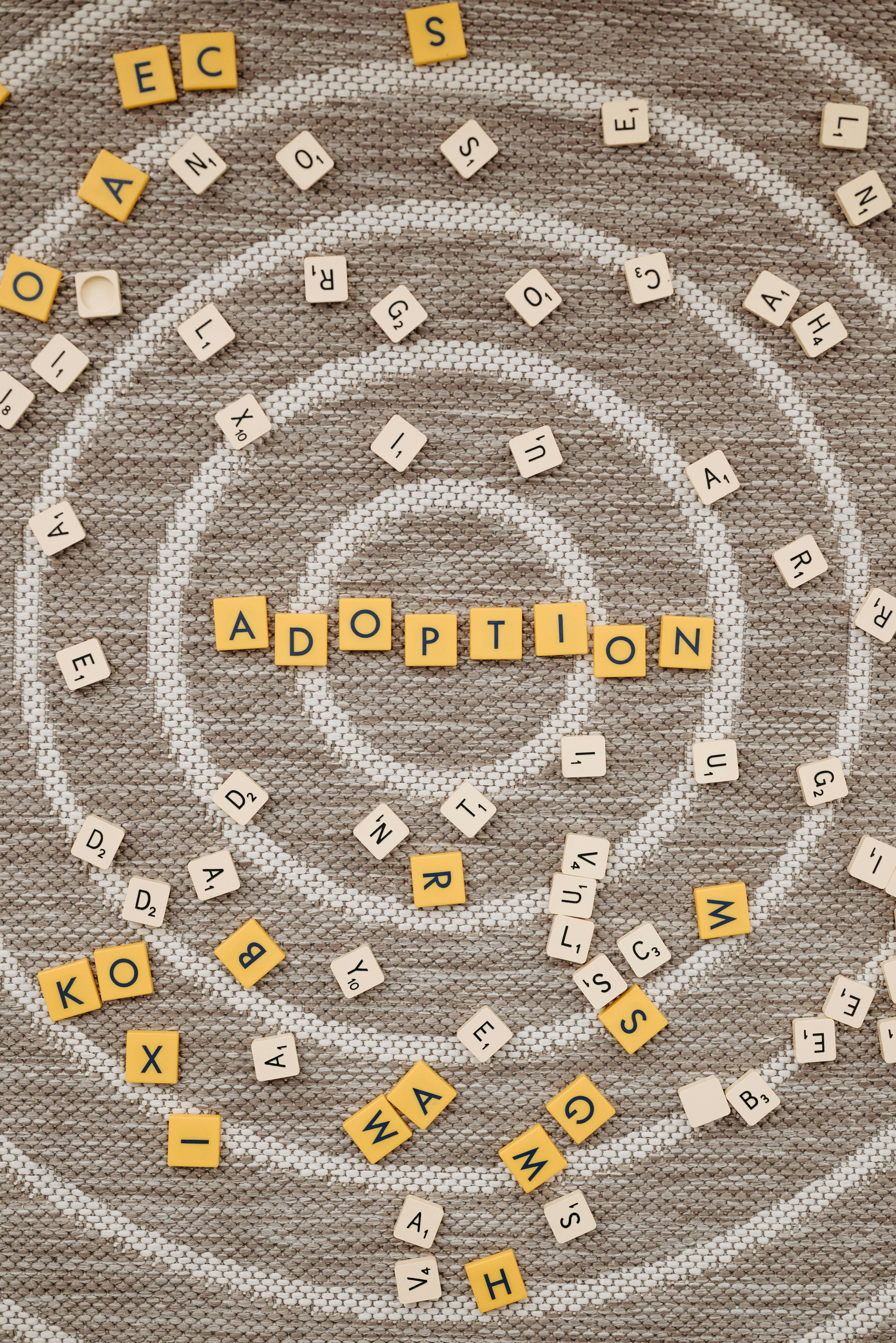 Adoption Text on Brown Surface · Free Stock Photo