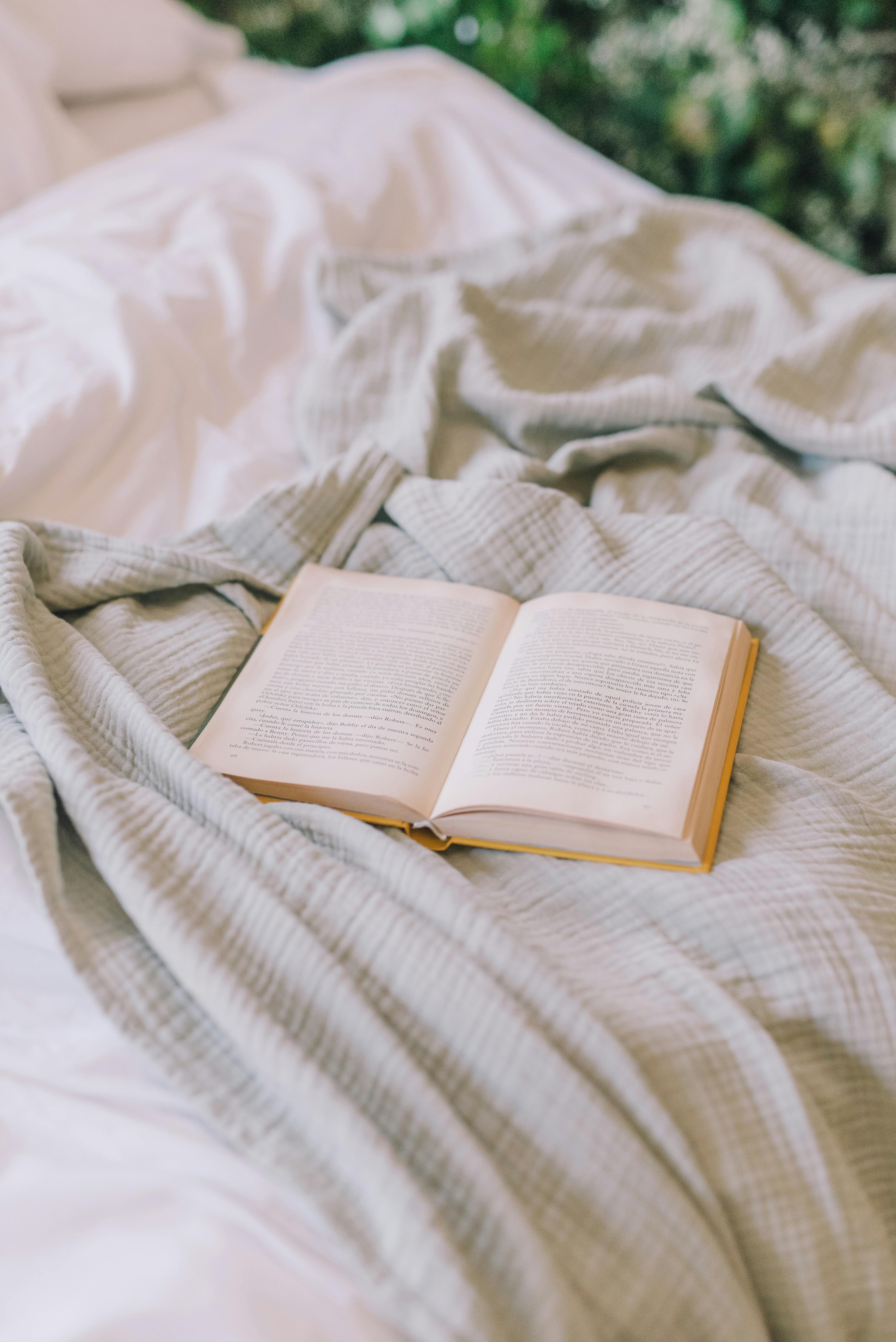 Book on Blanket on Bed · Free Stock Photo
