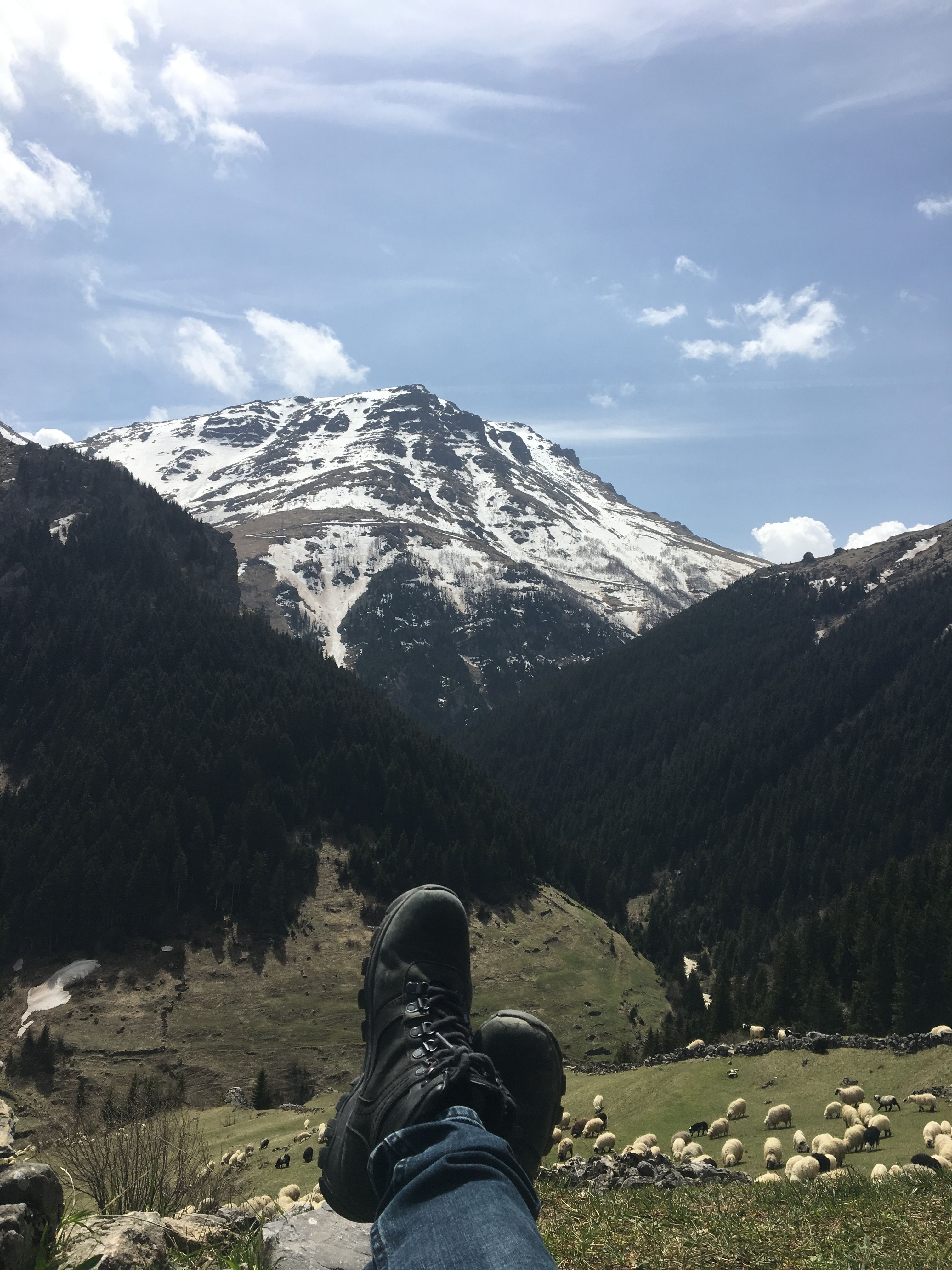 Person Legs on Mountains Landscape · Free Stock Photo