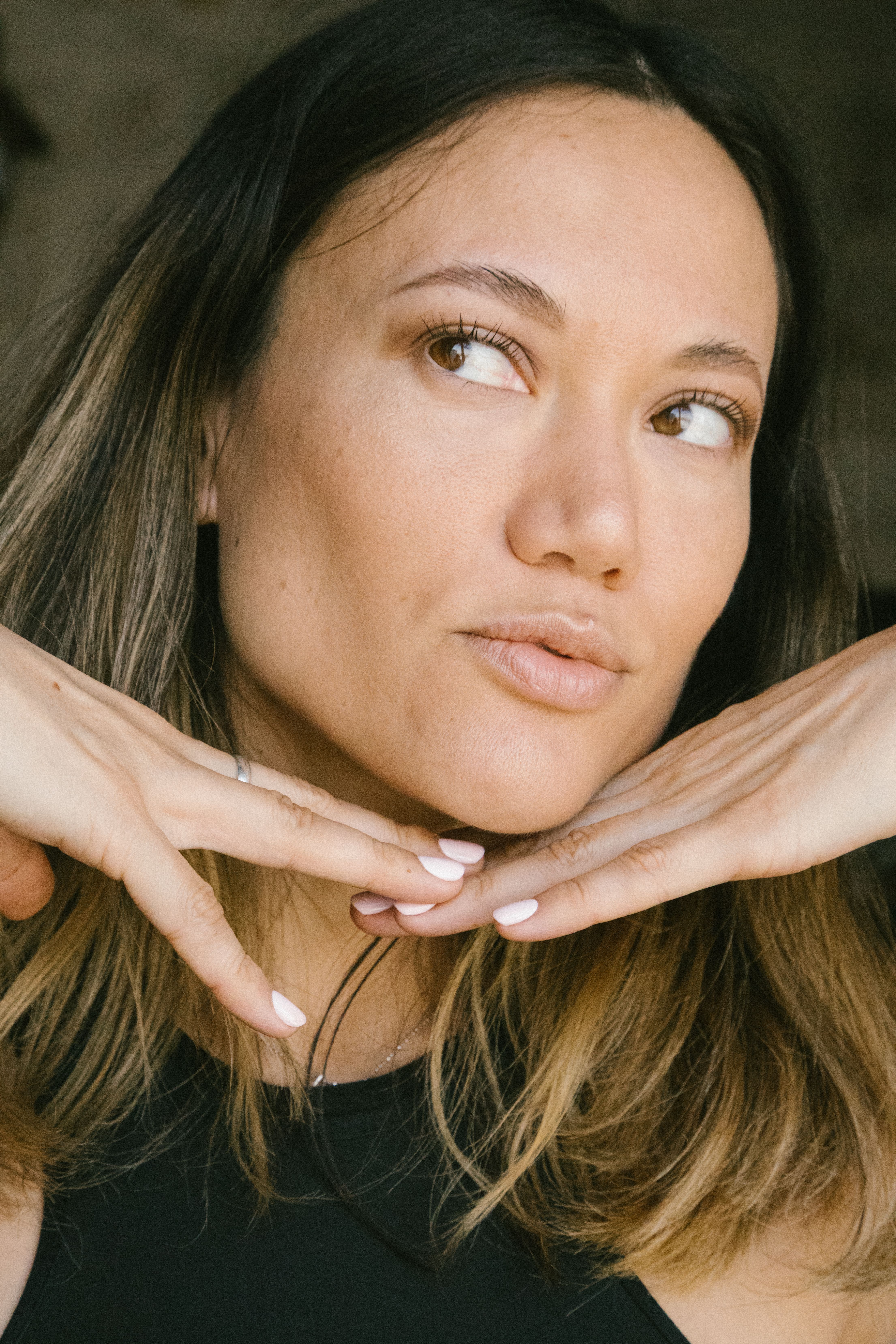 Woman Posing with Hands Near Face · Free Stock Photo