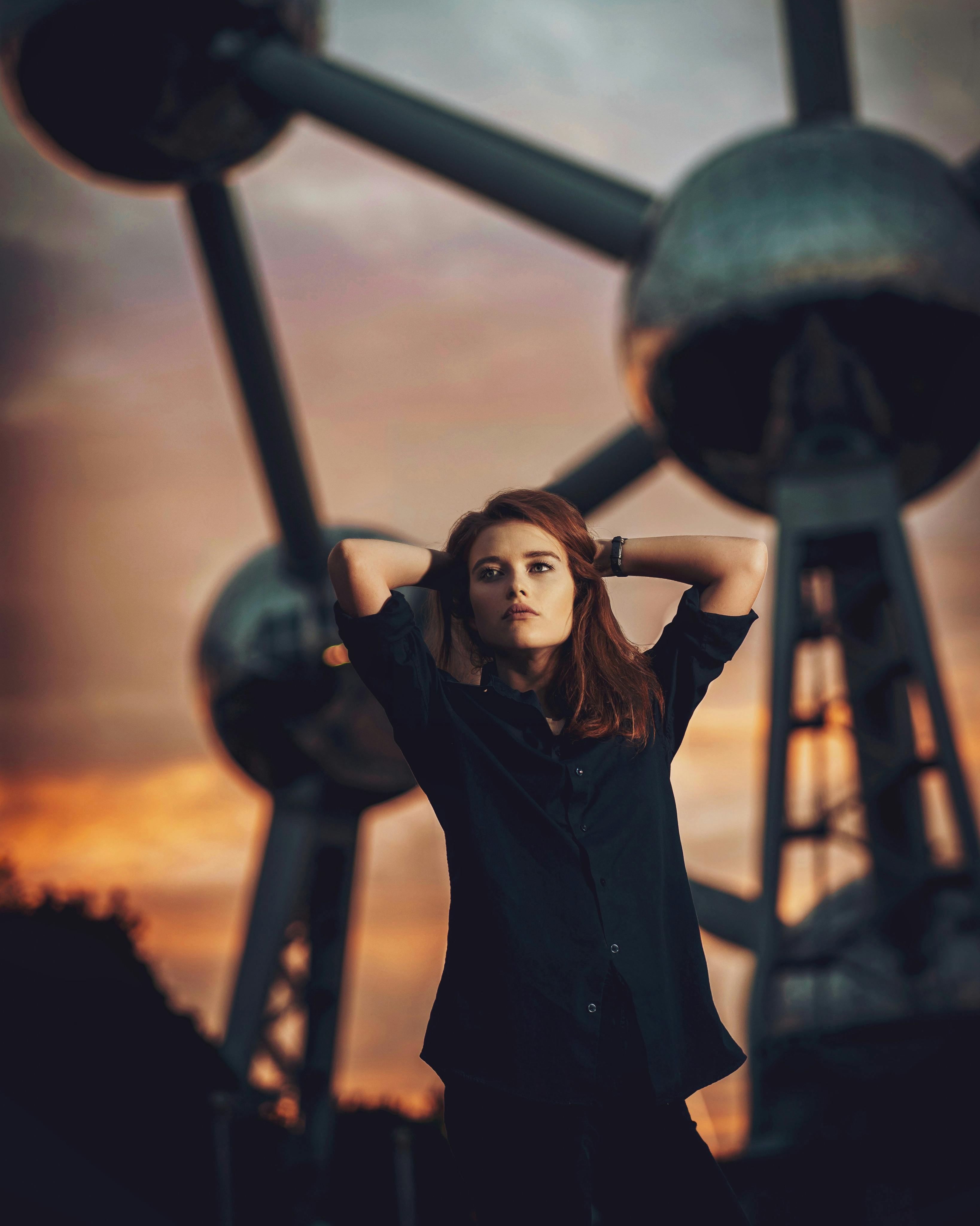 A Woman Posing with her Hands on Her Head · Free Stock Photo