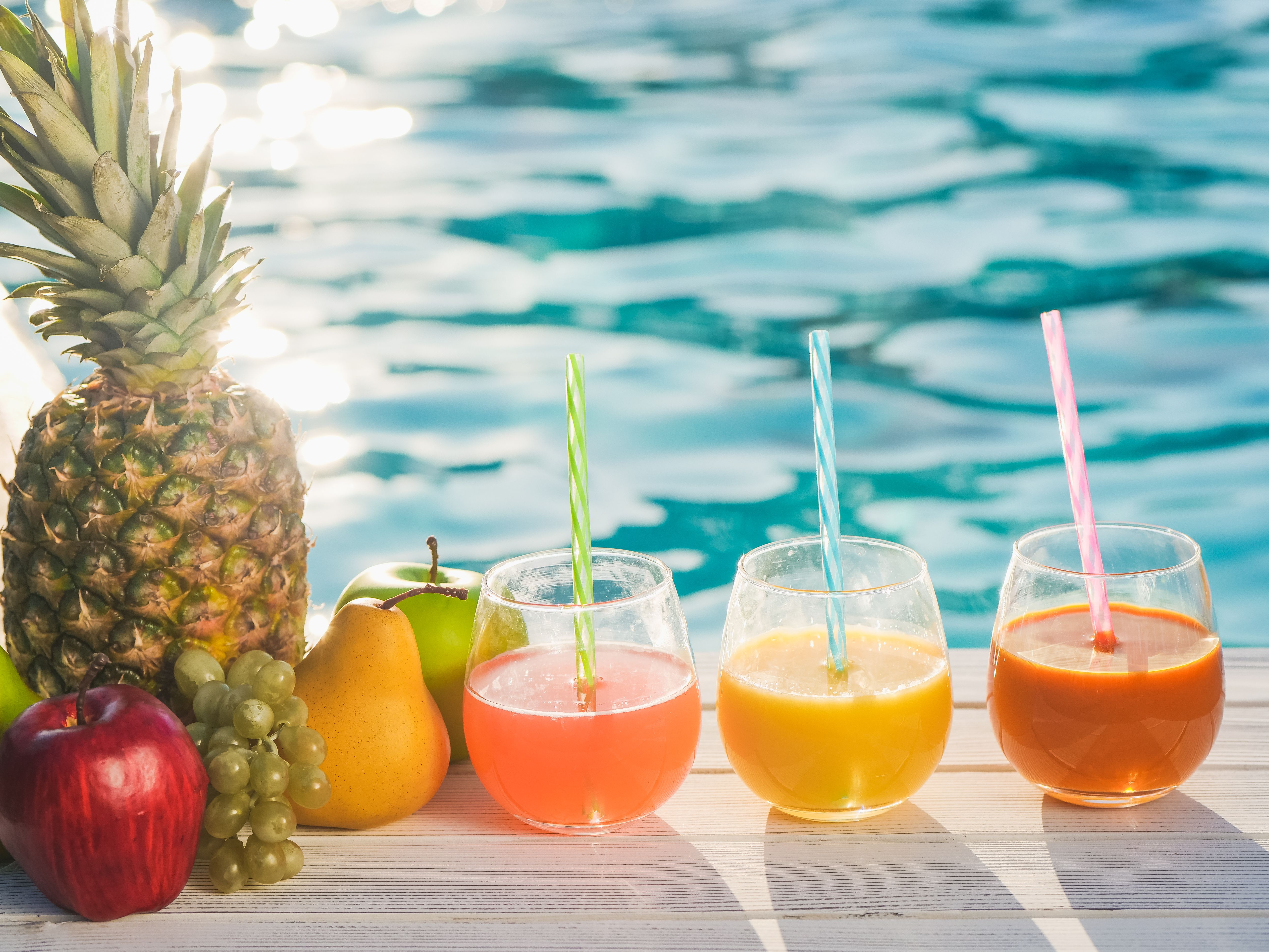 Drinking Straws in Coconut · Free Stock Photo