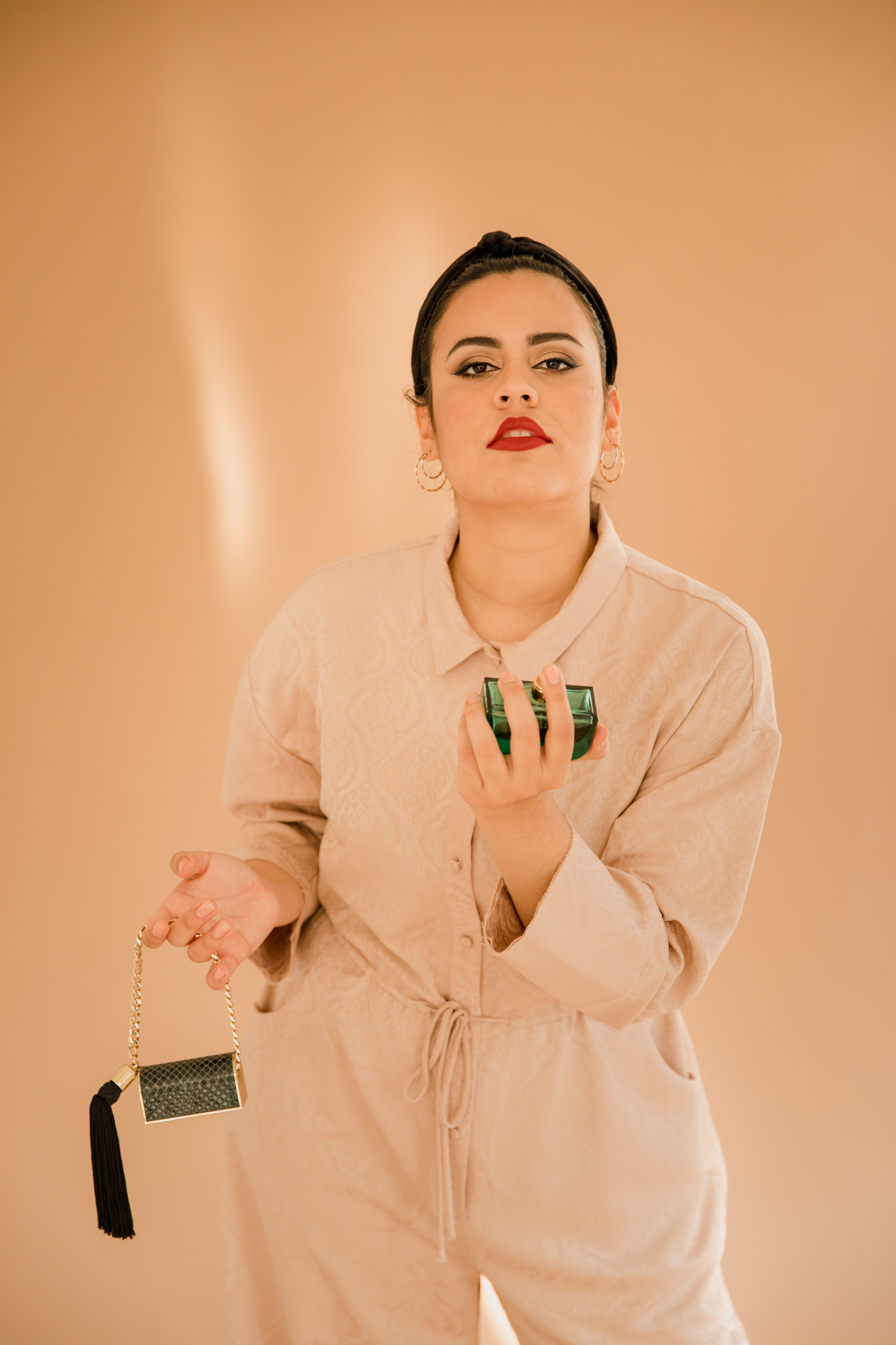 Woman Spraying Perfume · Free Stock Photo