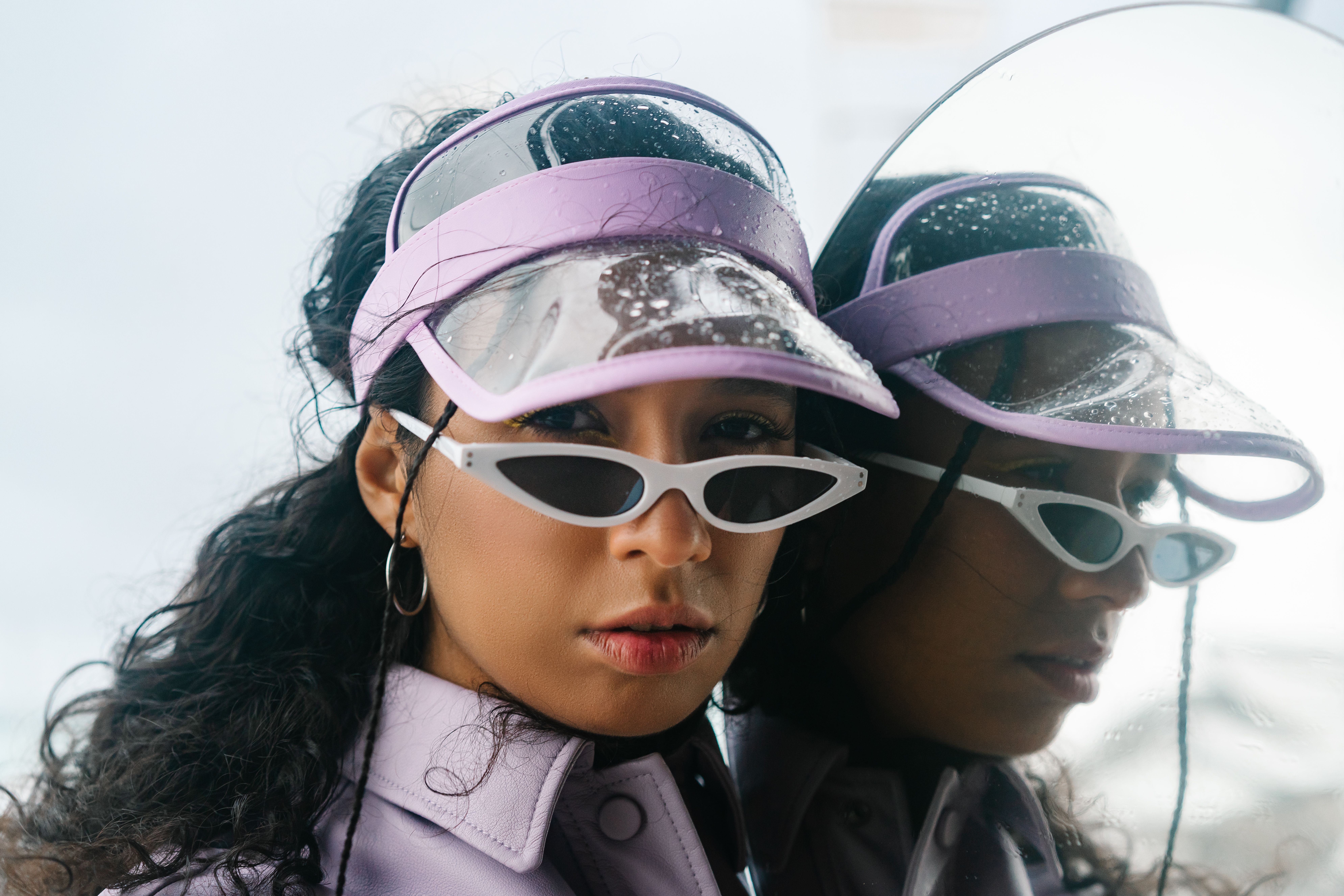 A Woman Wearing a Sun Visor · Free Stock Photo