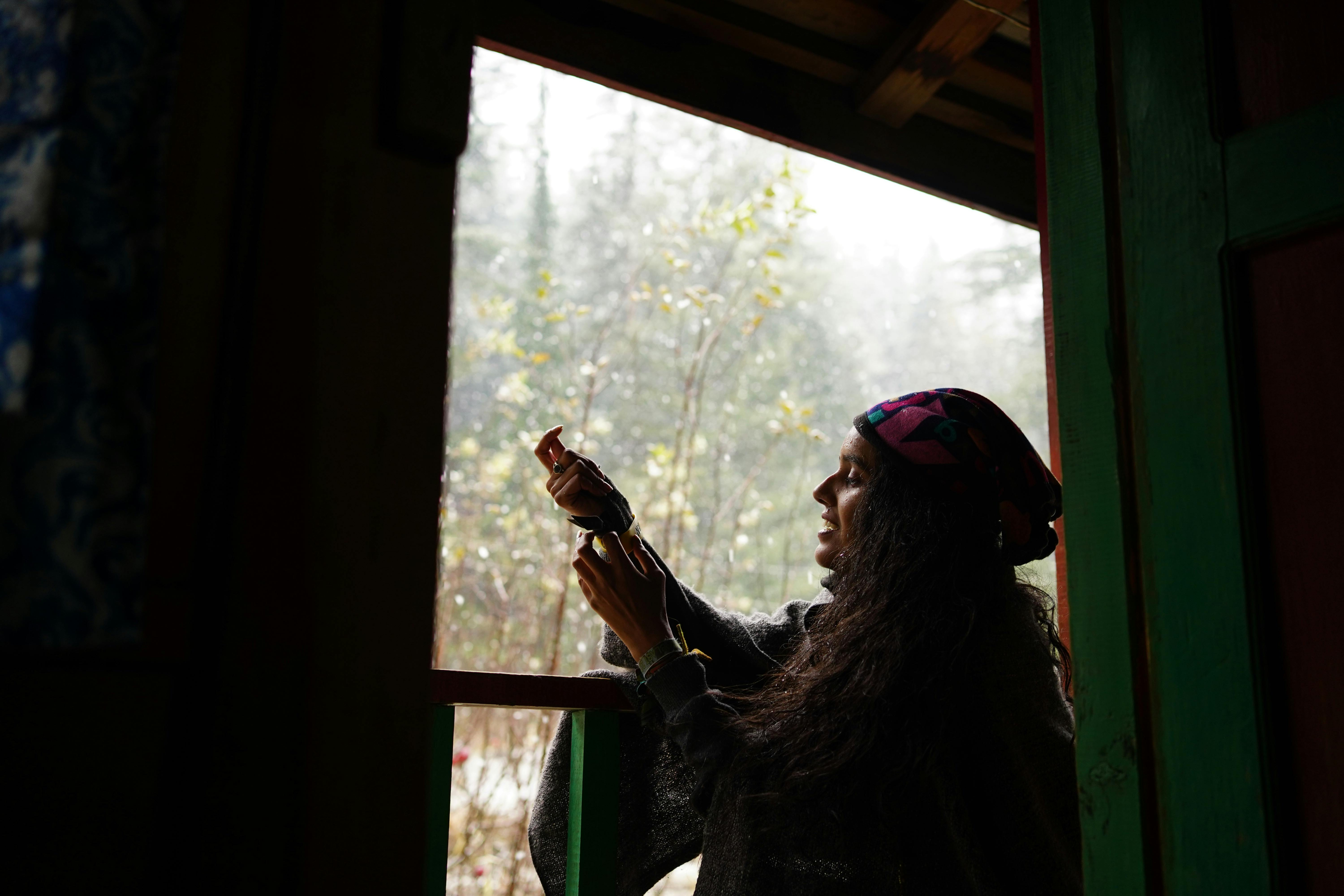 Woman Looking Outside the Window · Free Stock Photo