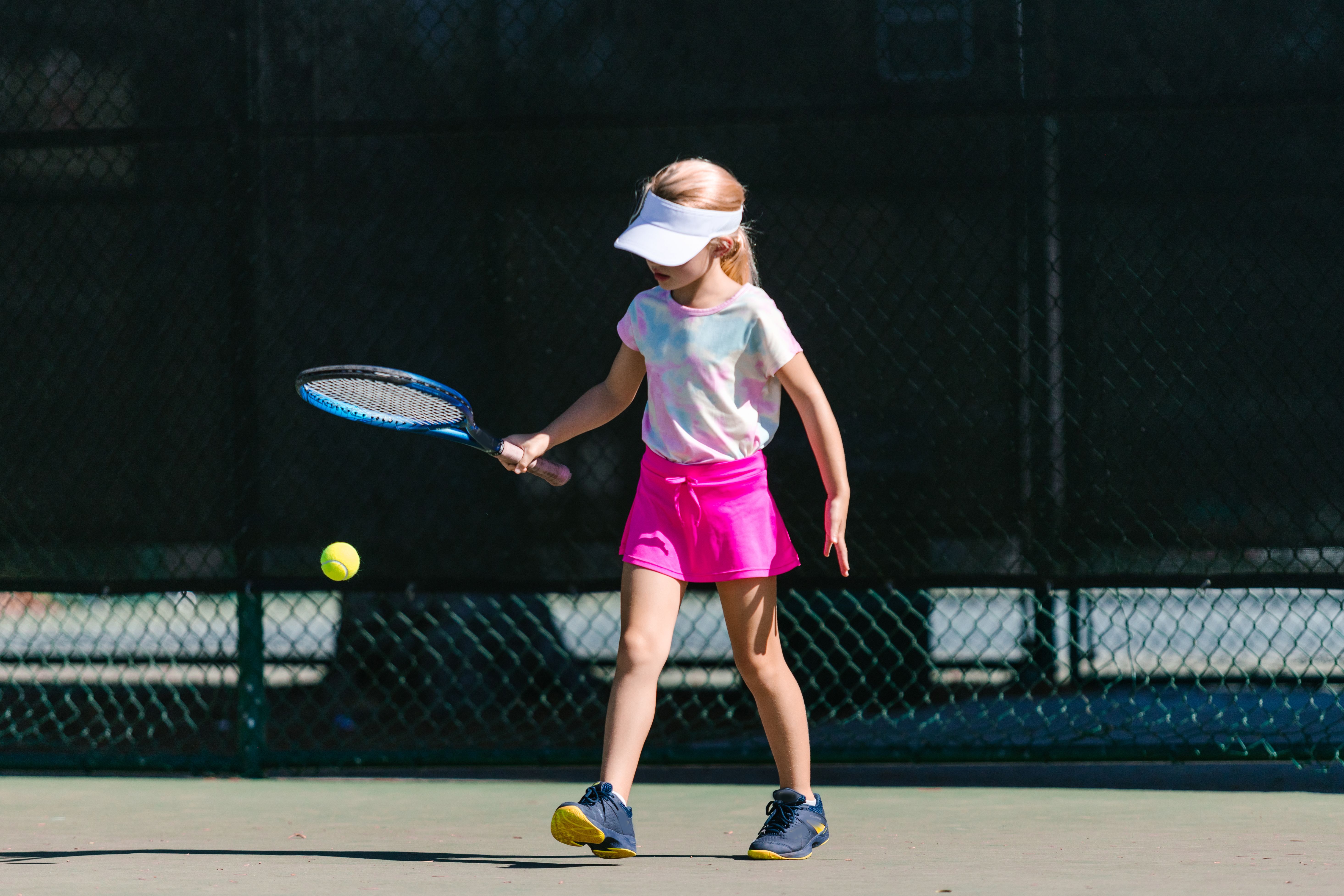 Low-Angle Shot of Girl Playing Tennis · Free Stock Photo