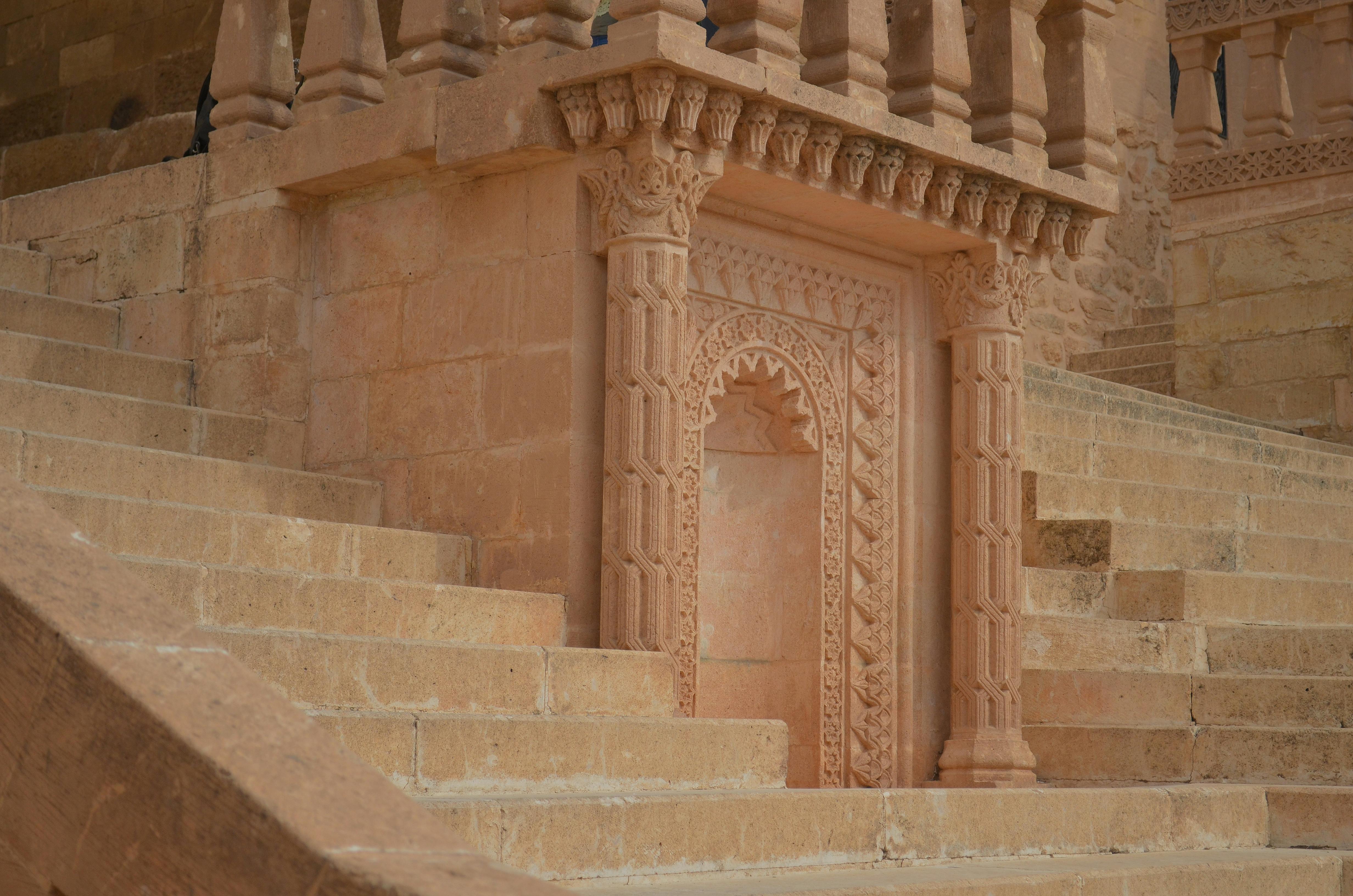 Close-up of Stairs and Columns of a Sandstone Temple · Free Stock Photo