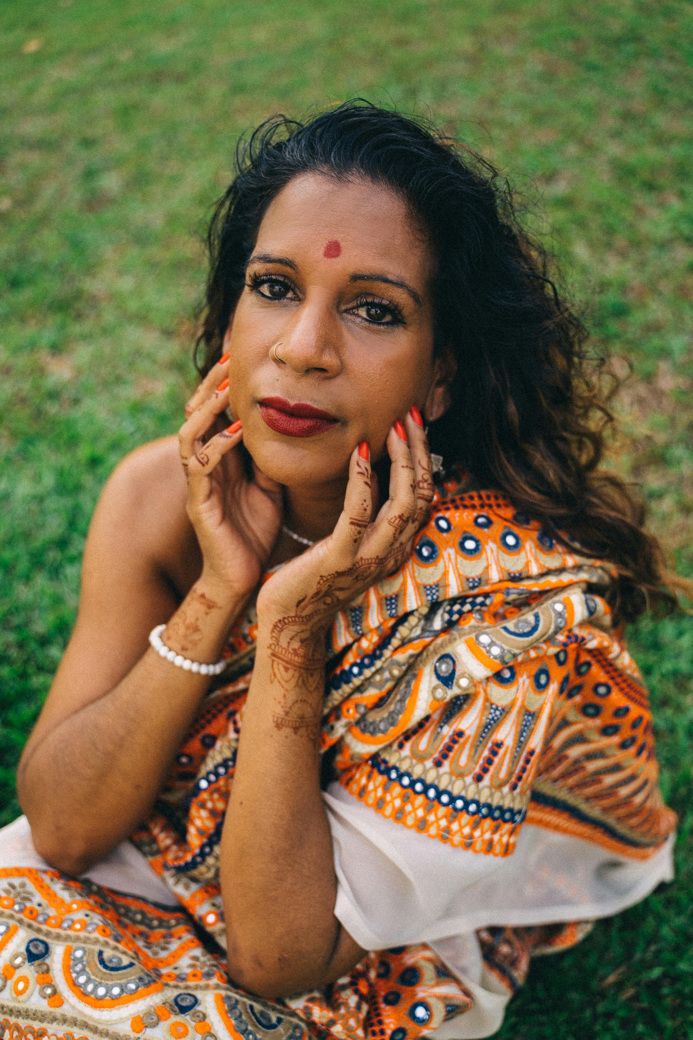 A Woman With Henna Wearing a Saree · Free Stock Photo
