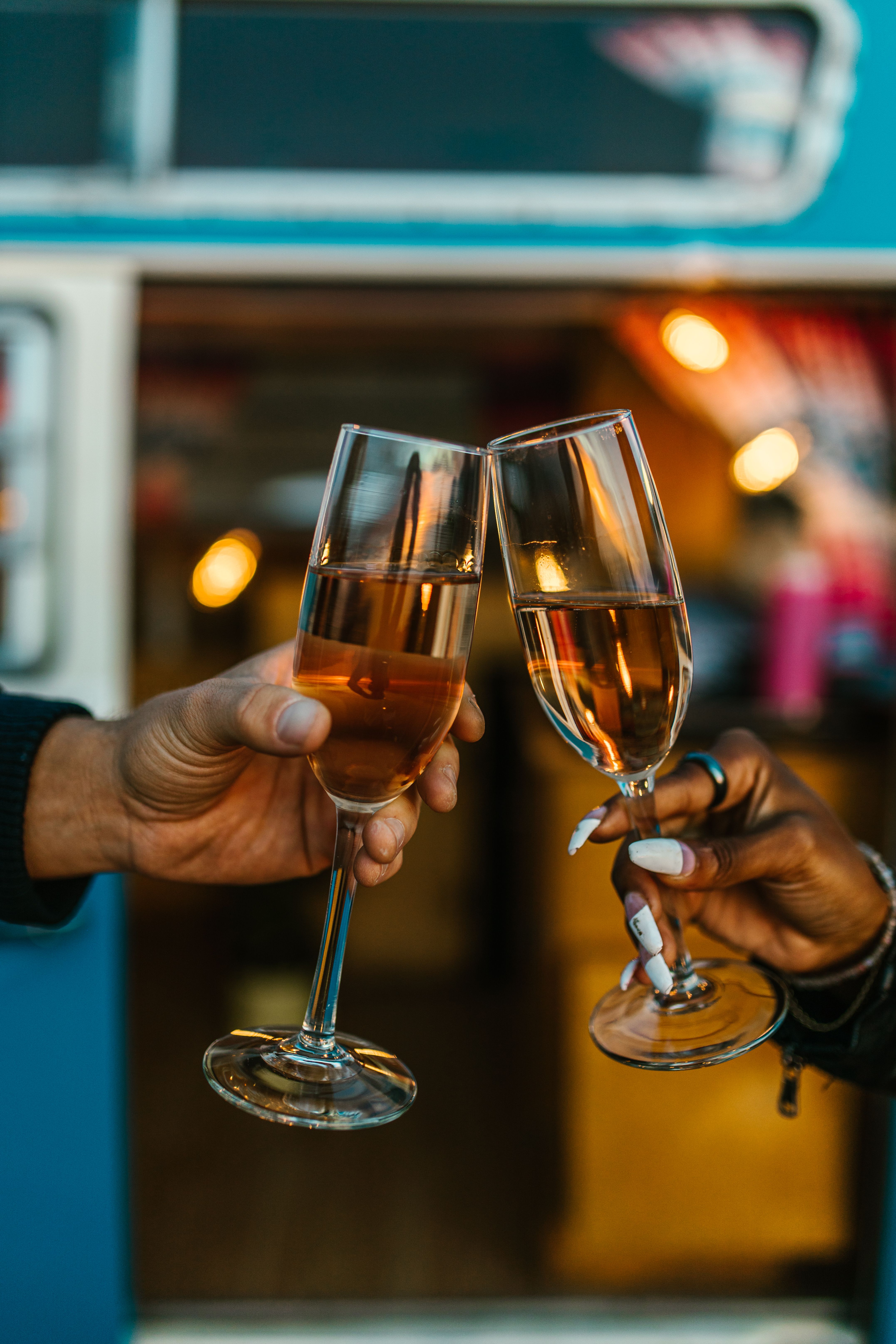 A Celebratory Toast With Wine Glasses Clinking Photos, Download The ...