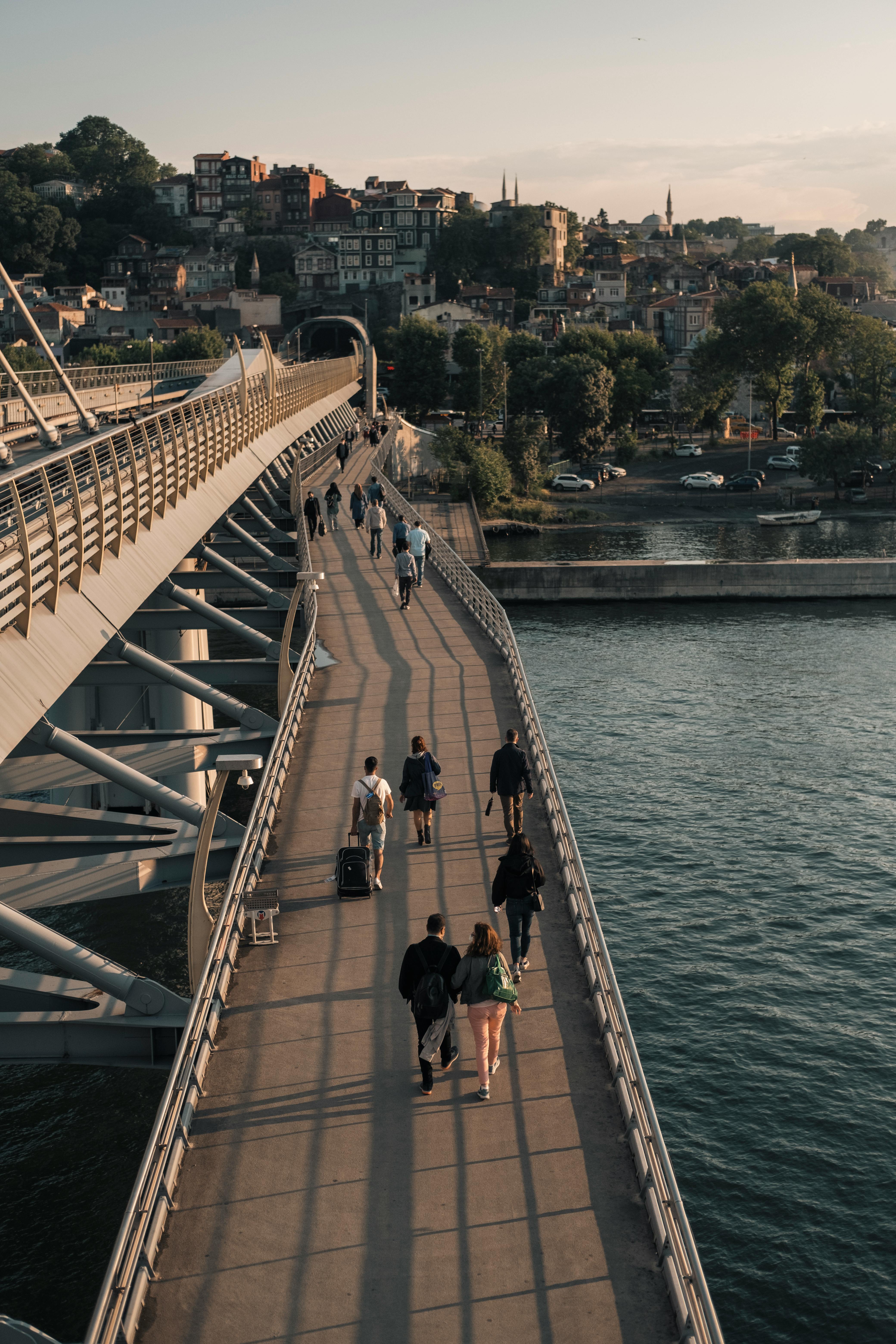 People Walking on Bridge · Free Stock Photo