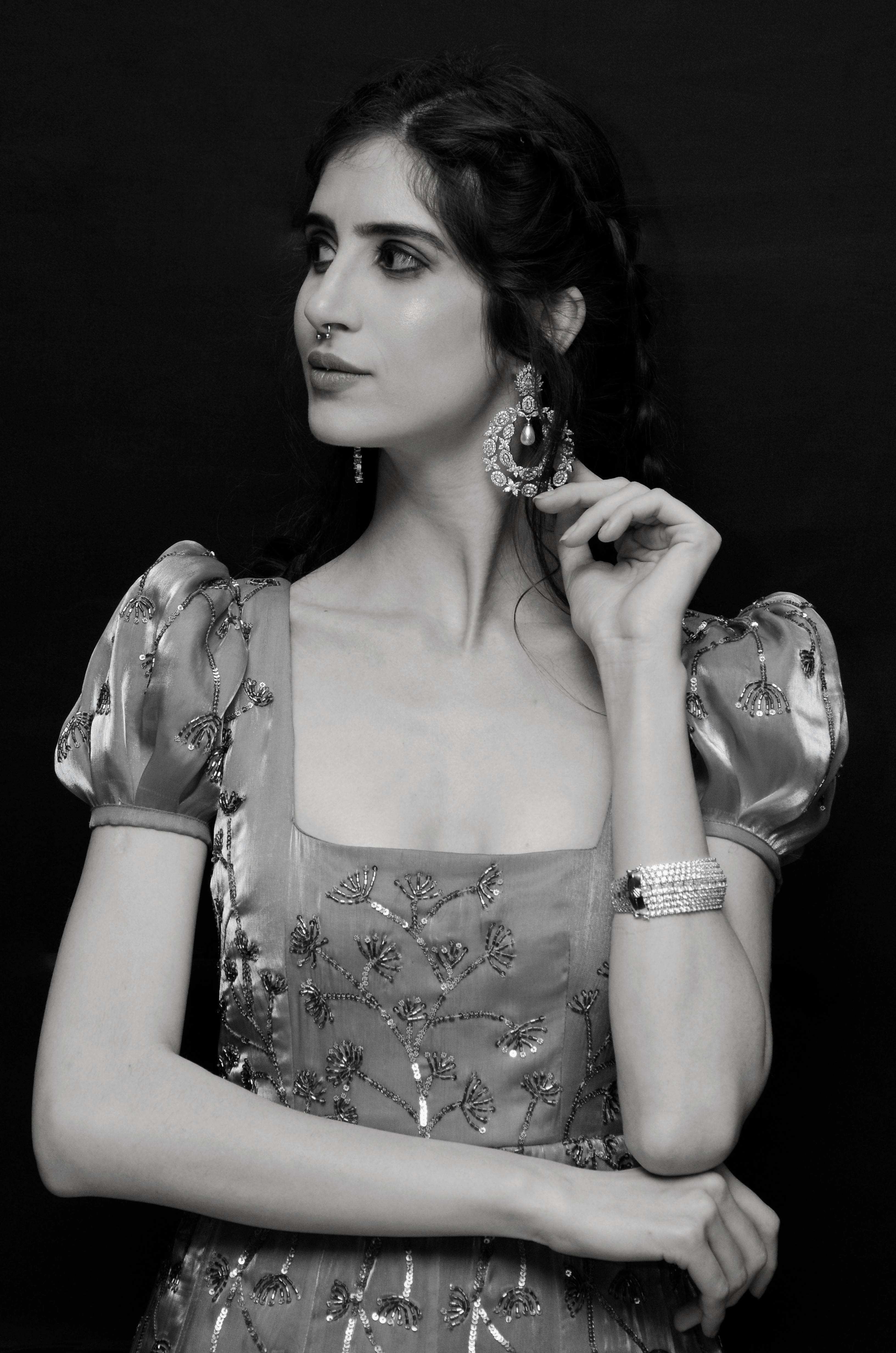 Pretty Woman Wearing Long Sleeves Posing · Free Stock Photo