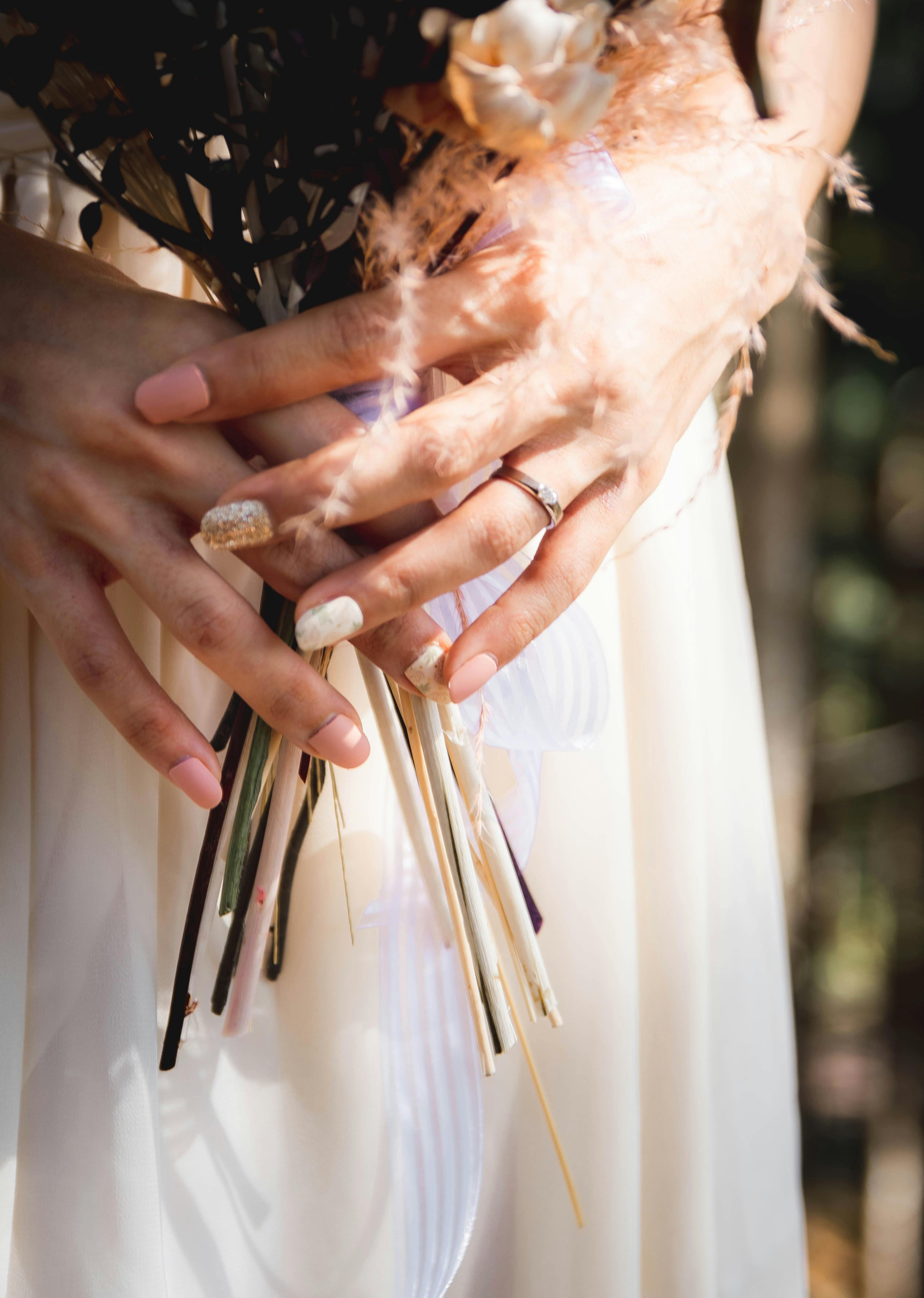 Hand Holding Flowers · Free Stock Photo