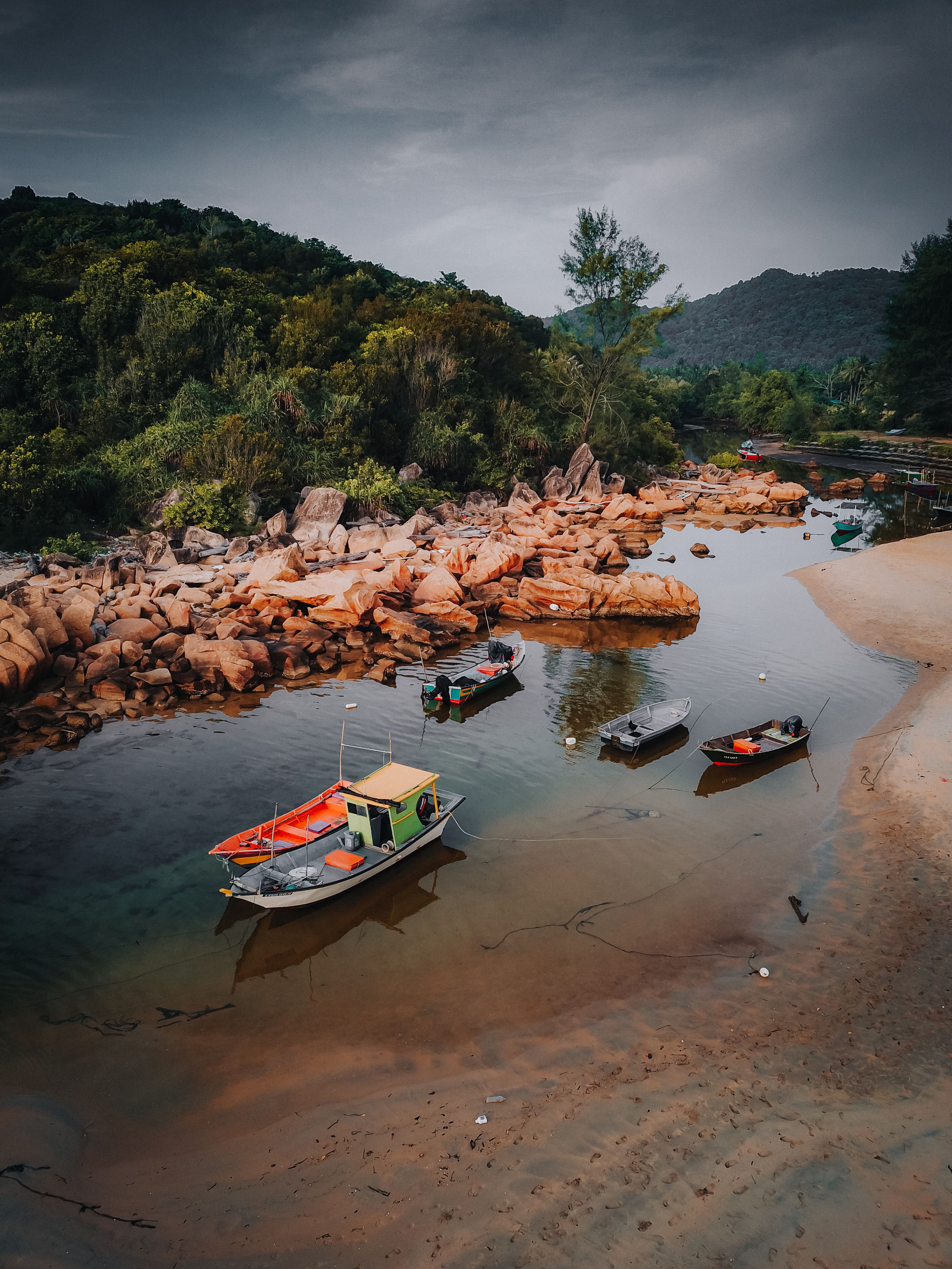 A Boat Sailing on the River Near Green Trees · Free Stock Photo