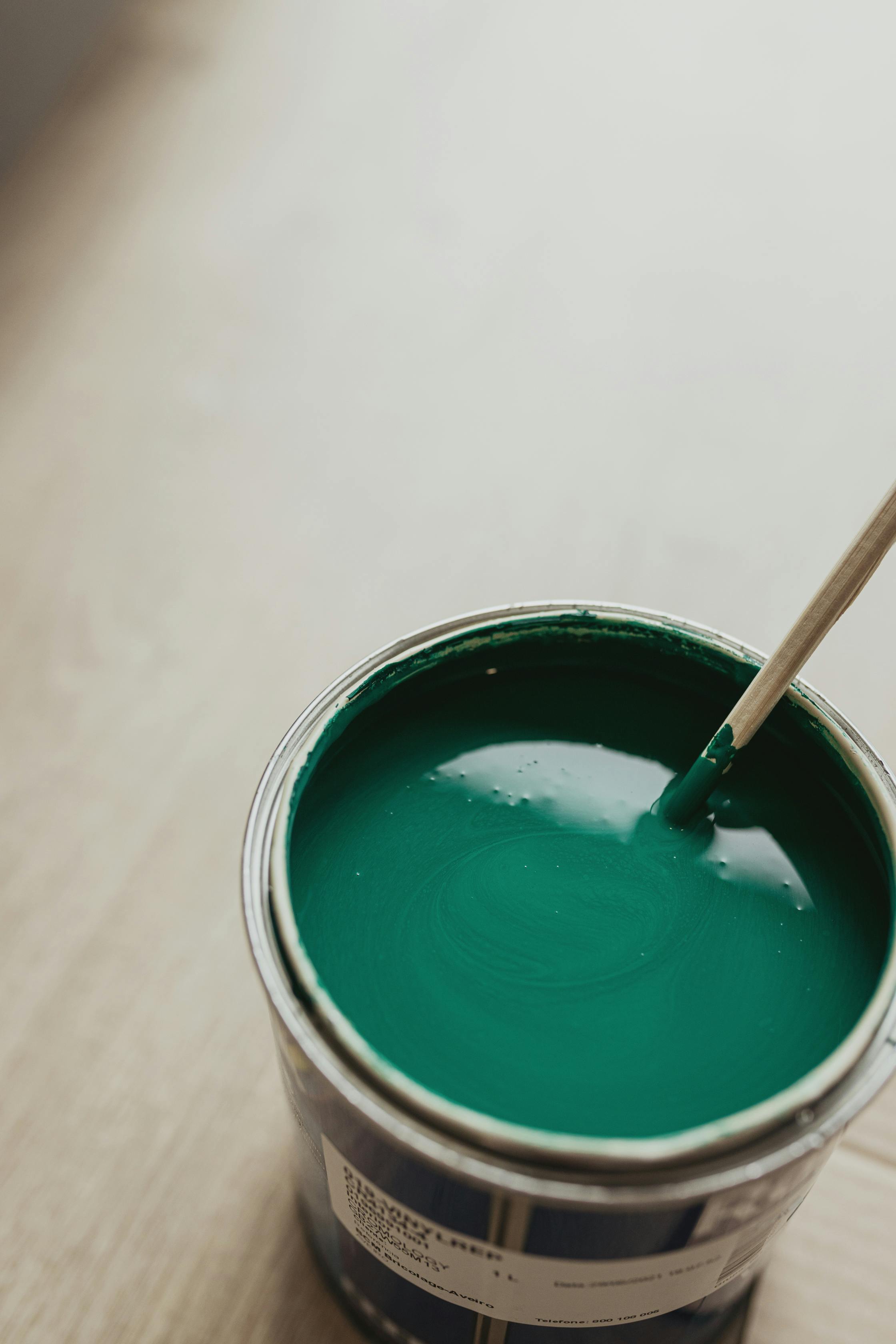 Close-Up Photo of a Can with Green Paint · Free Stock Photo
