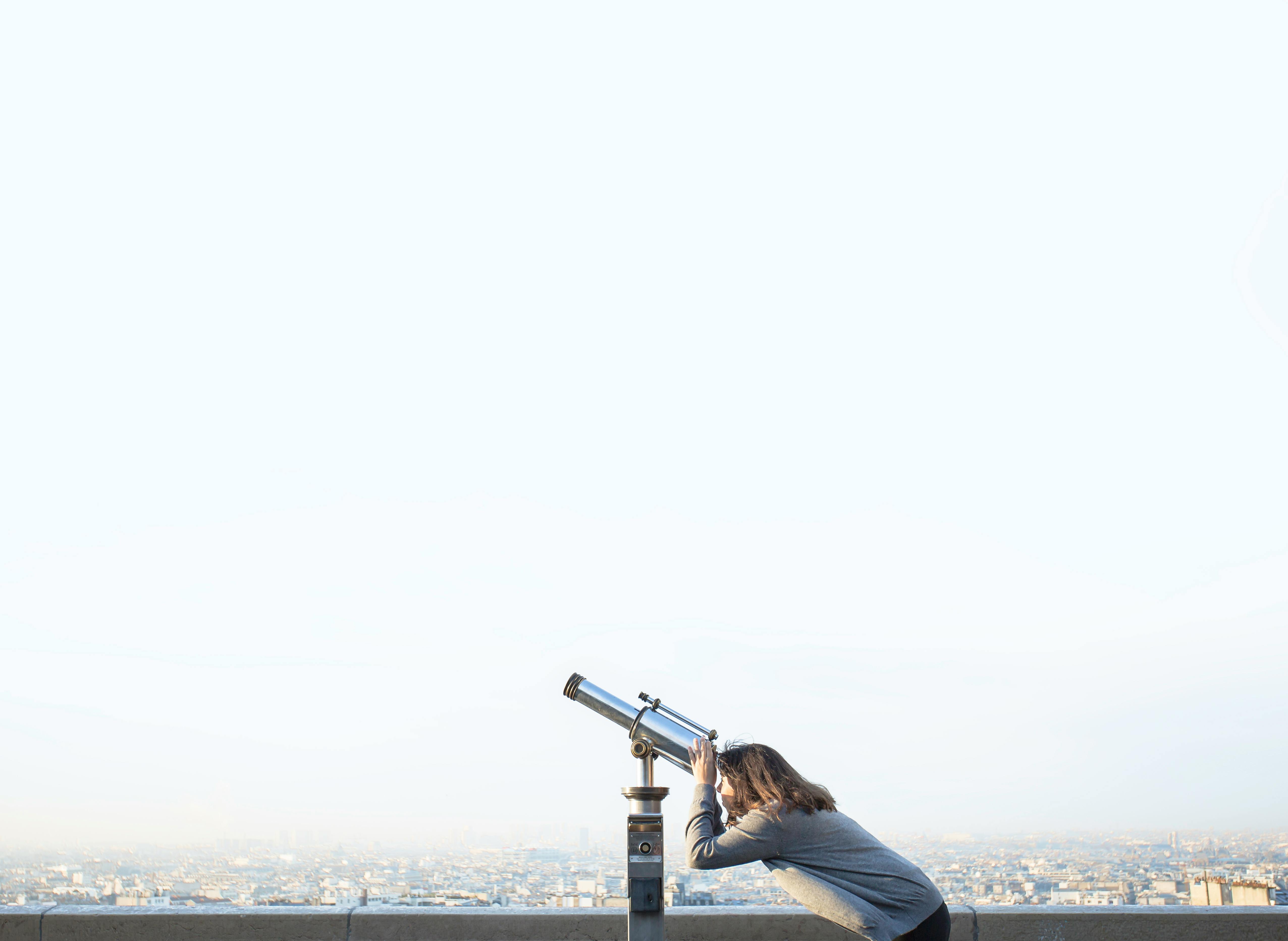 Woman Using Telescope · Free Stock Photo