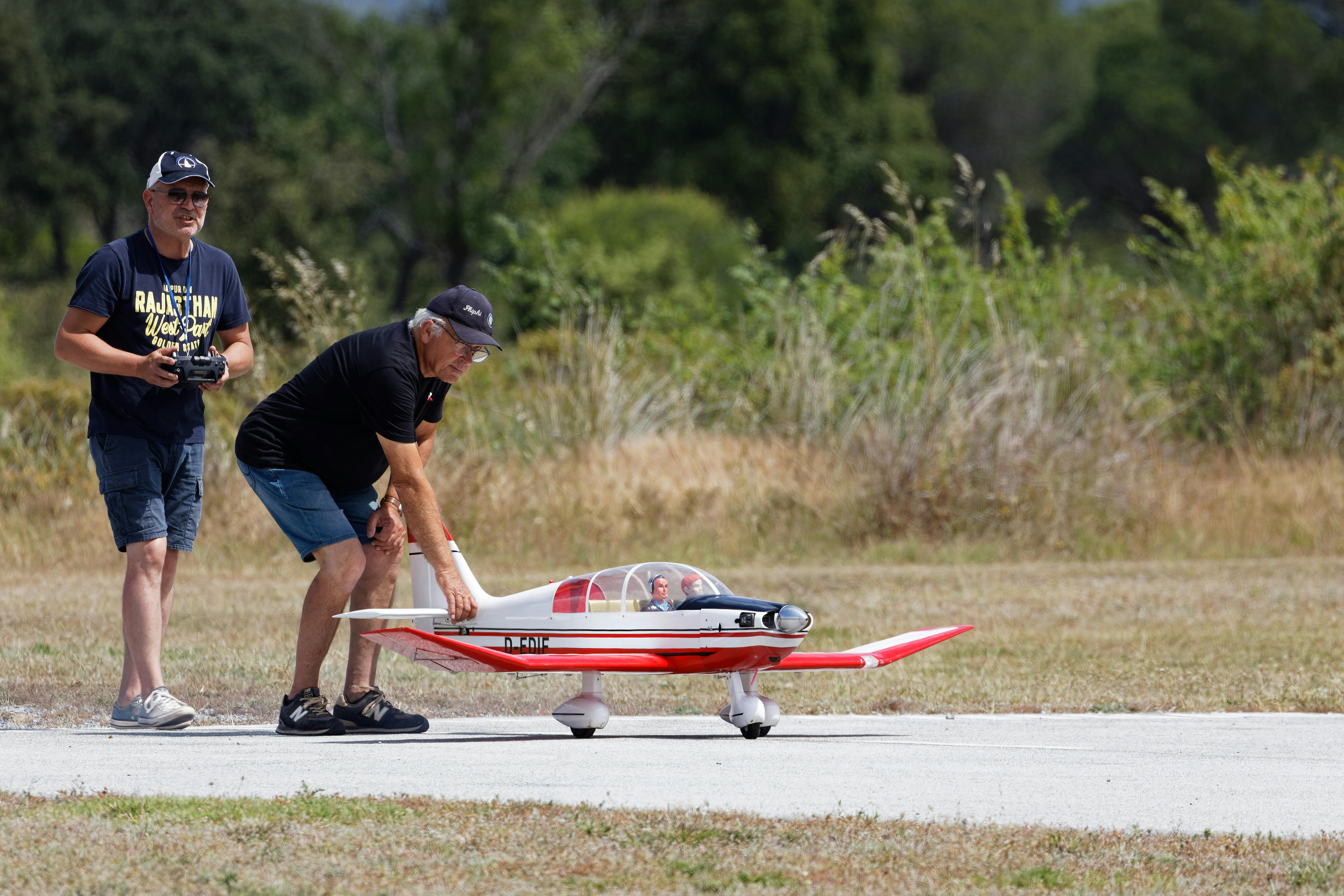 Men with Remote Controlled Airplane · Free Stock Photo