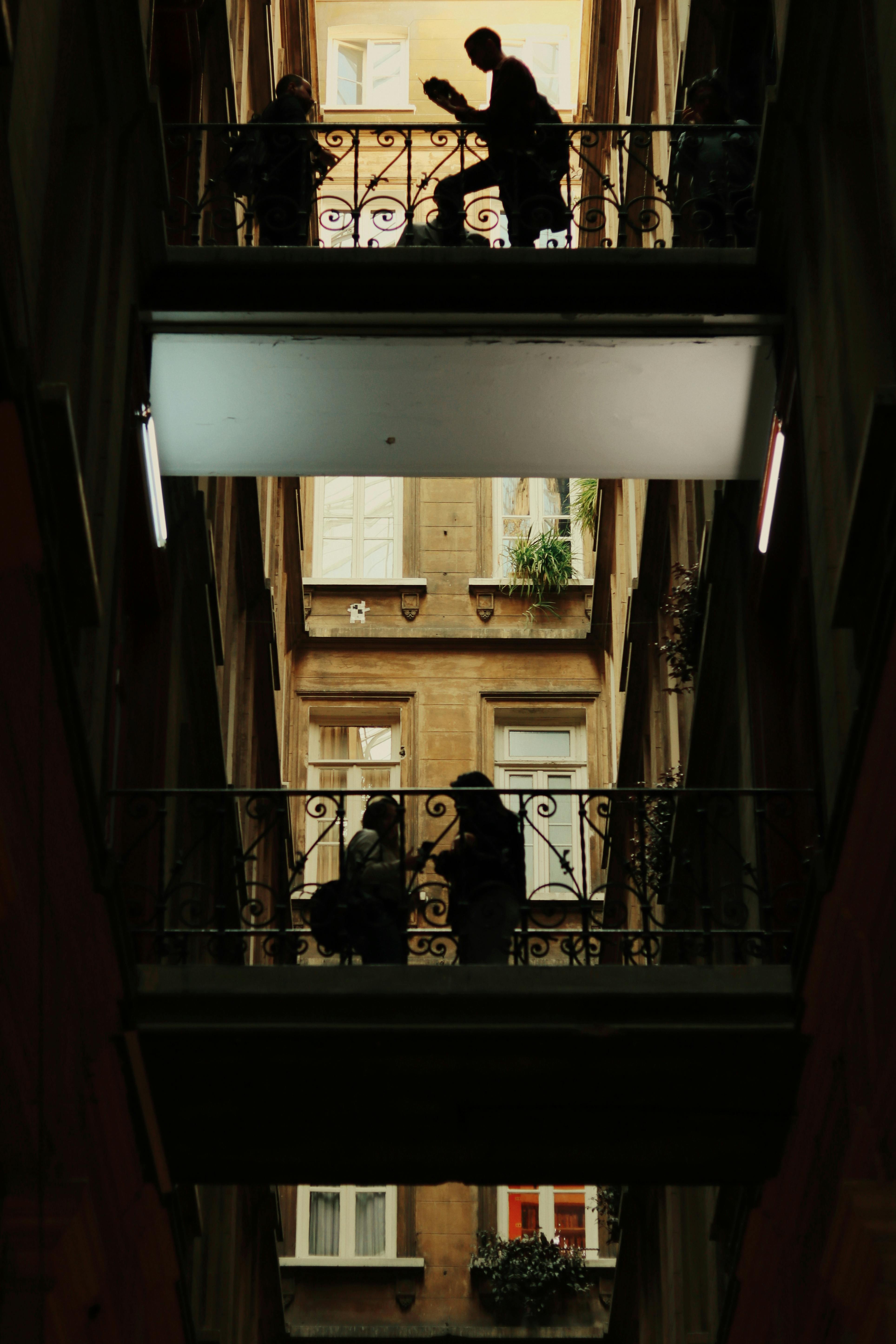 Crop person touching window of old house · Free Stock Photo