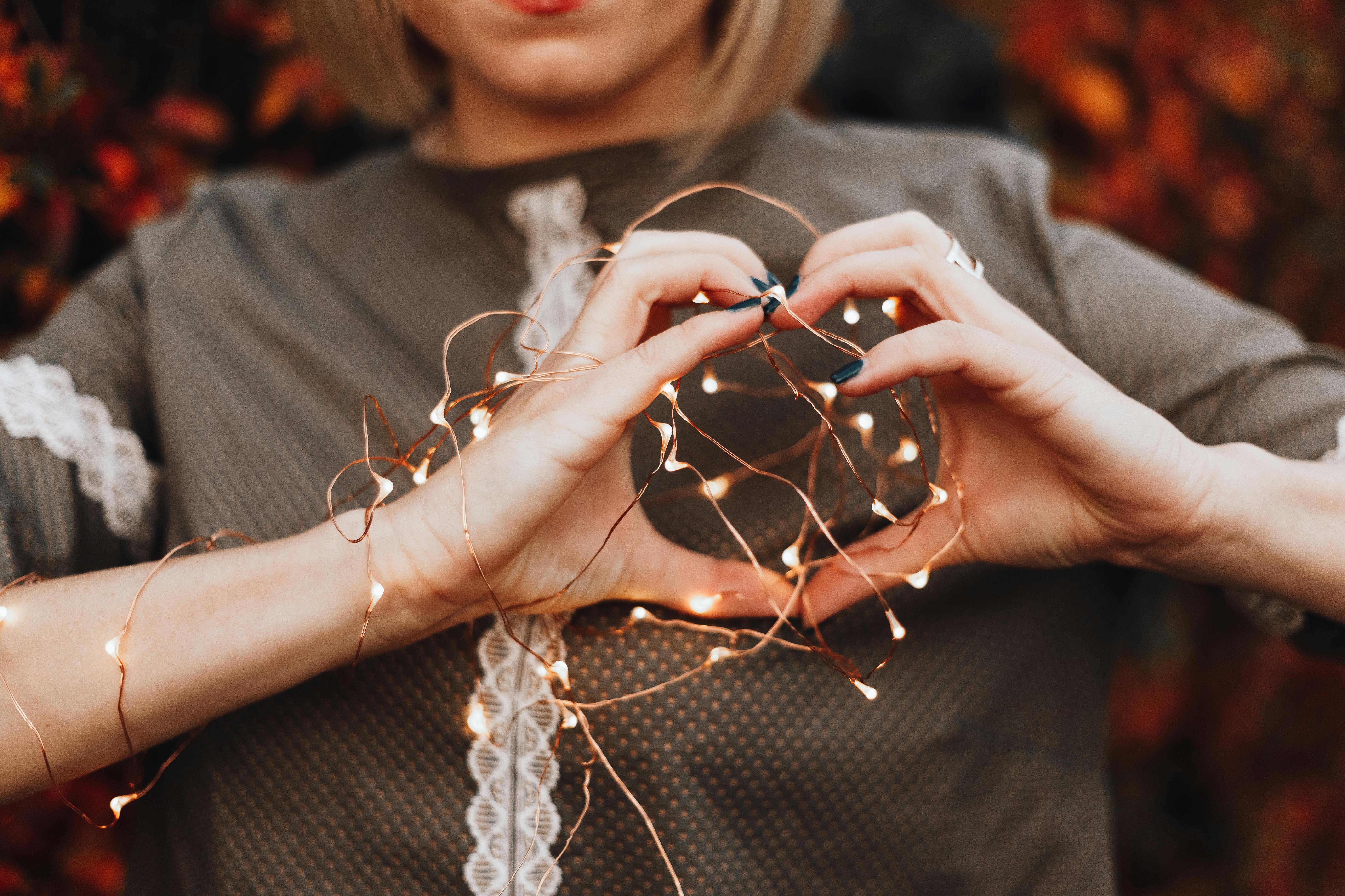 Hand Making Shapes on Yellow Background · Free Stock Photo