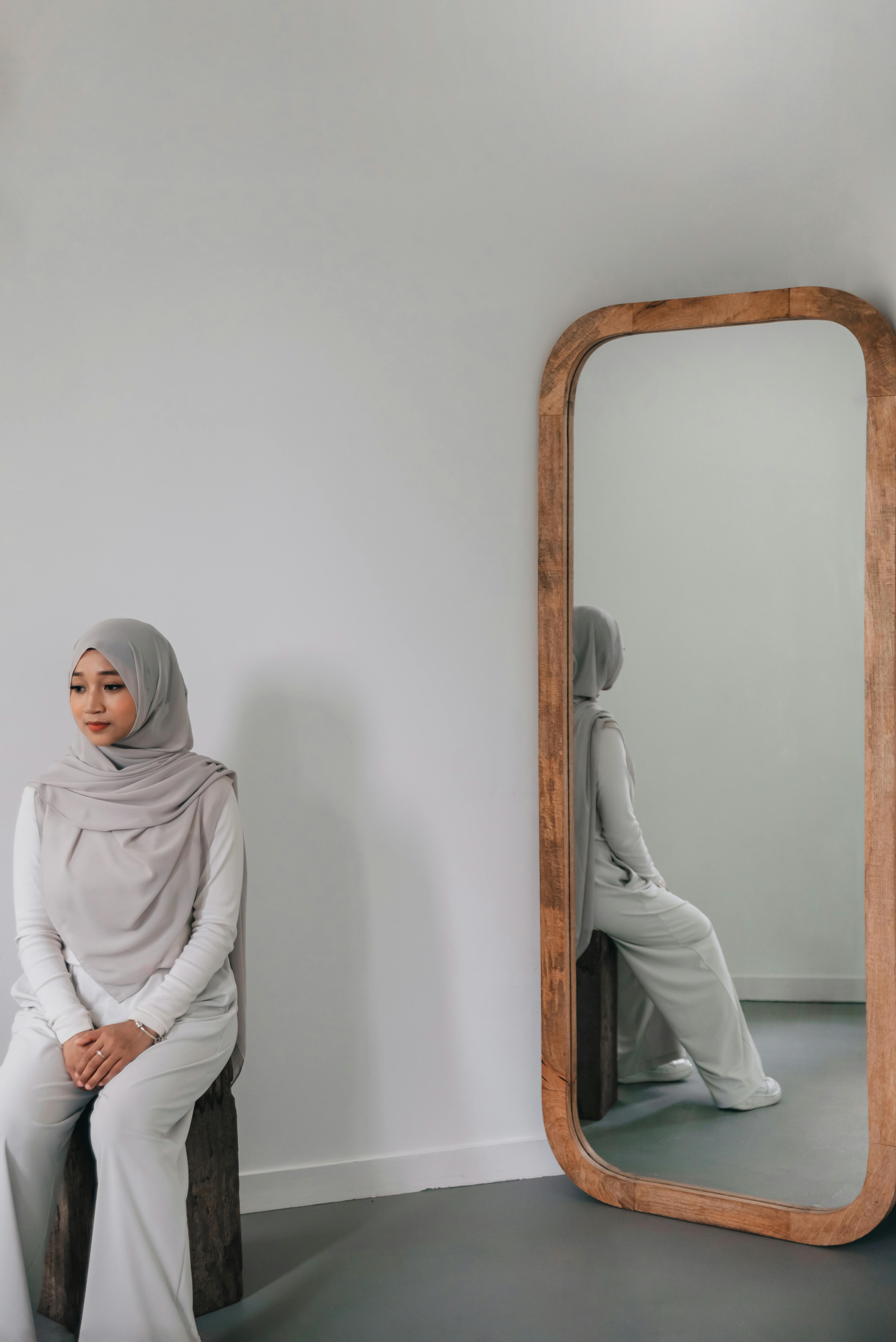 A Hijab Woman Sitting on a Chair · Free Stock Photo