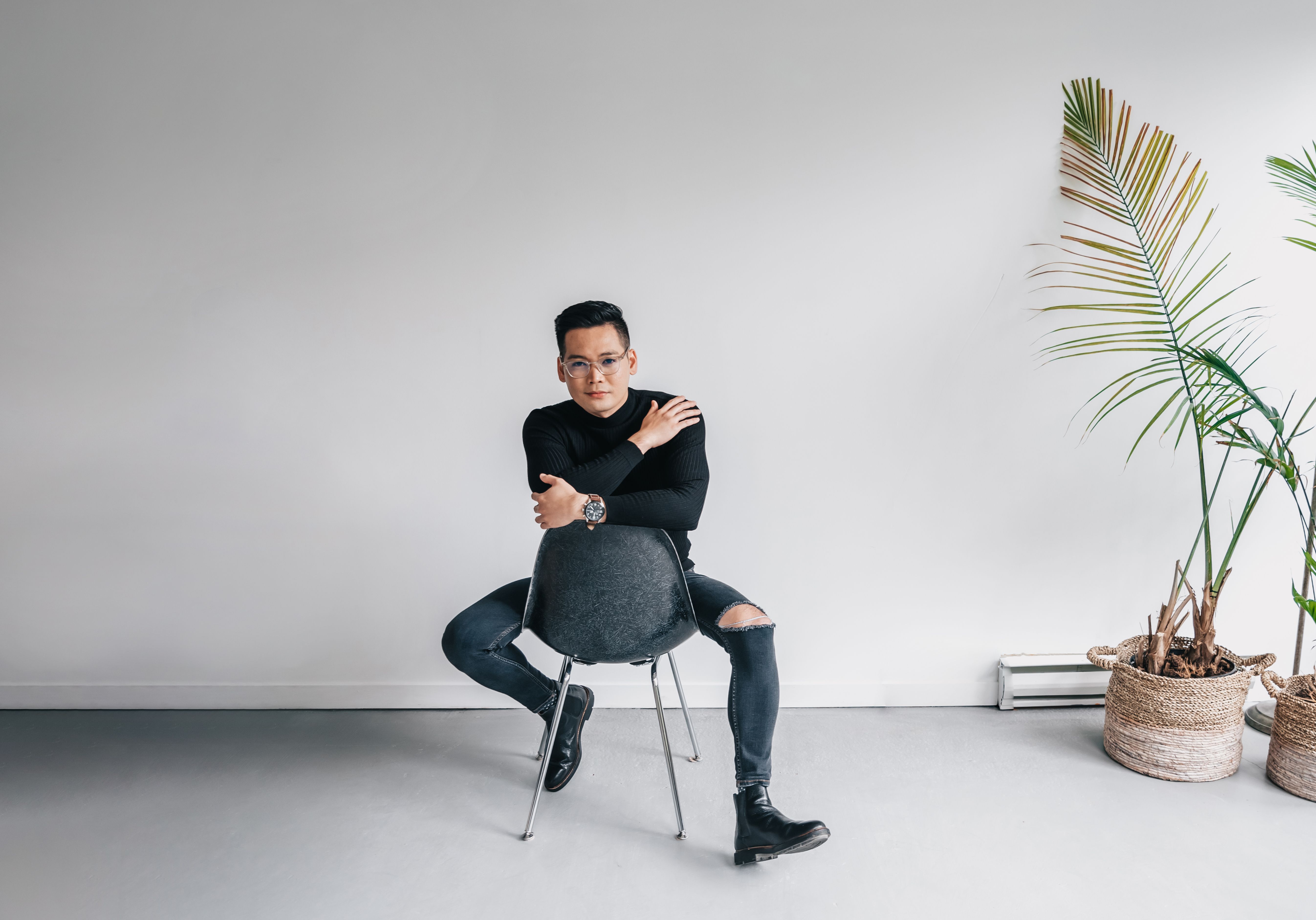 A Man Sitting on a Chair · Free Stock Photo