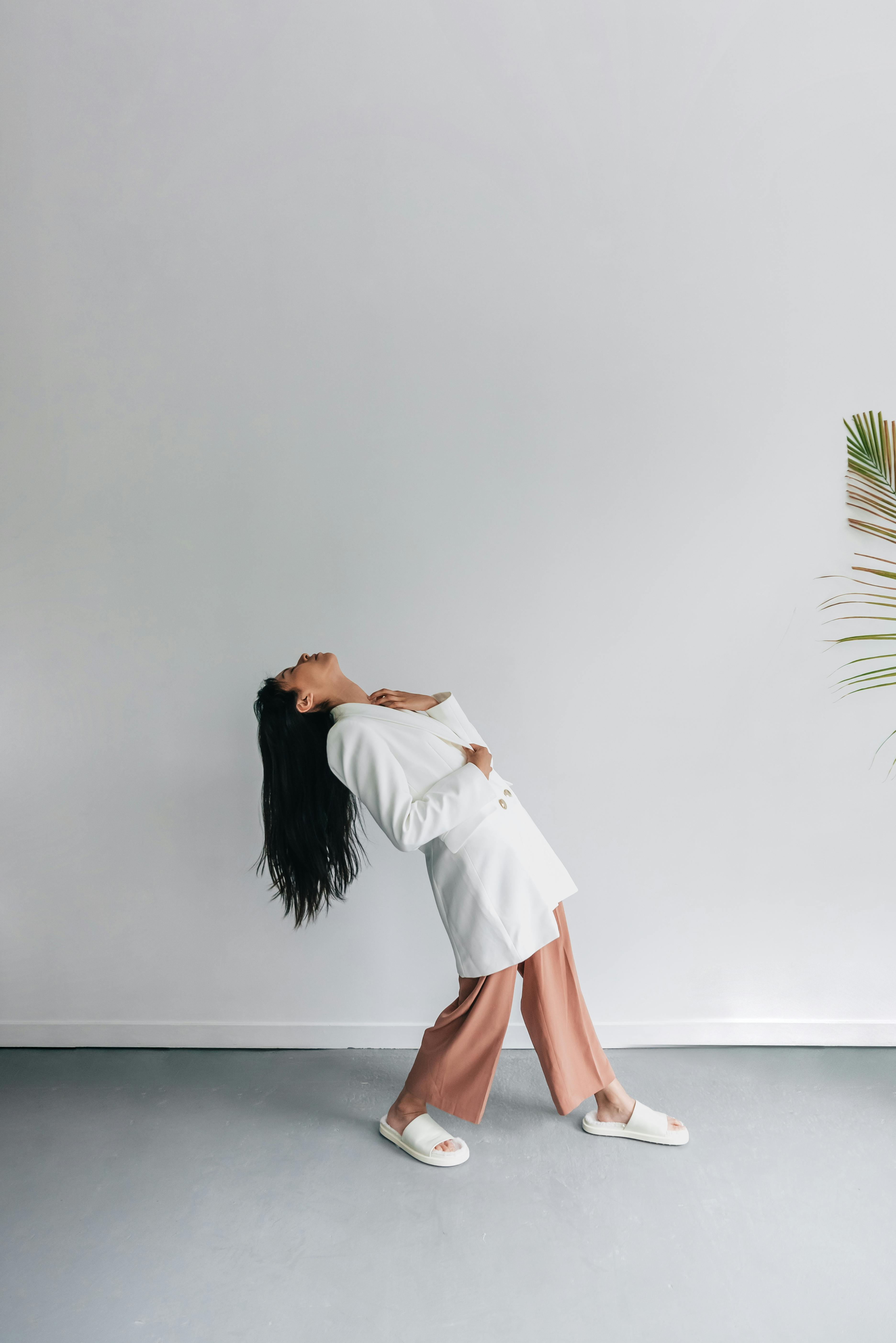 Woman with Black Hair Leaning Back · Free Stock Photo