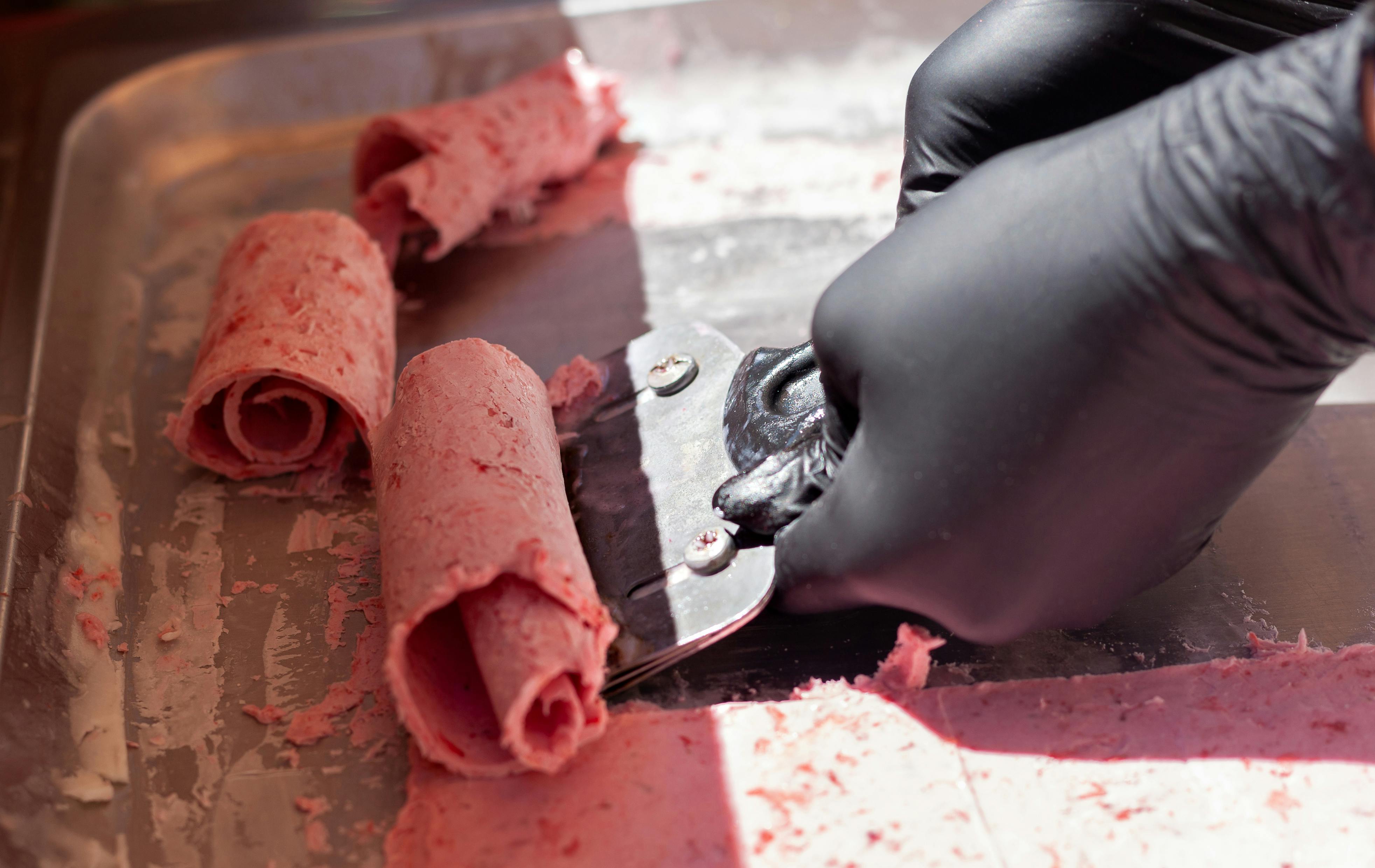 Woman Holding Silverware While Looking at Phone · Free Stock Photo