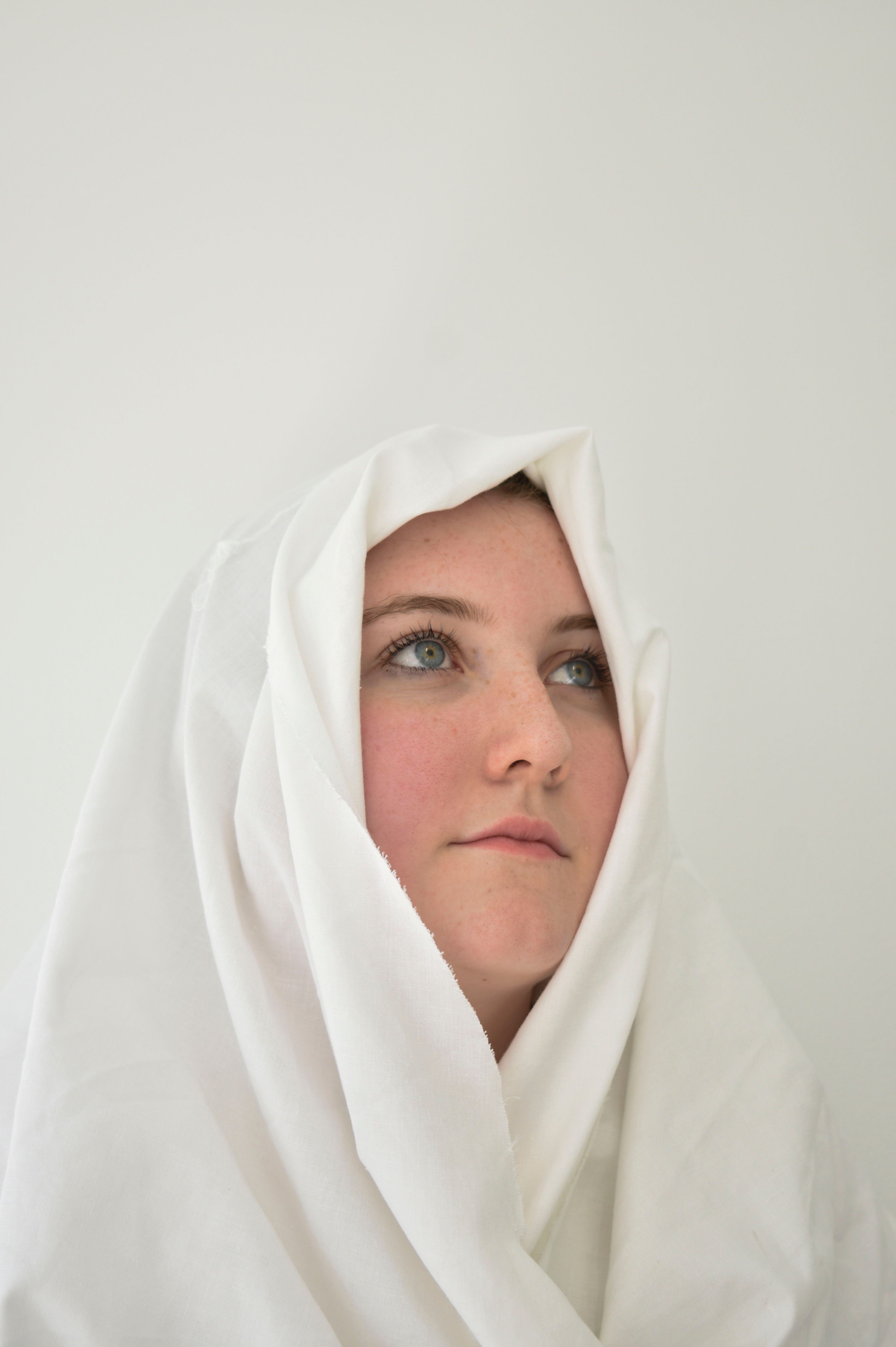 Woman Covering Eye with Hand · Free Stock Photo
