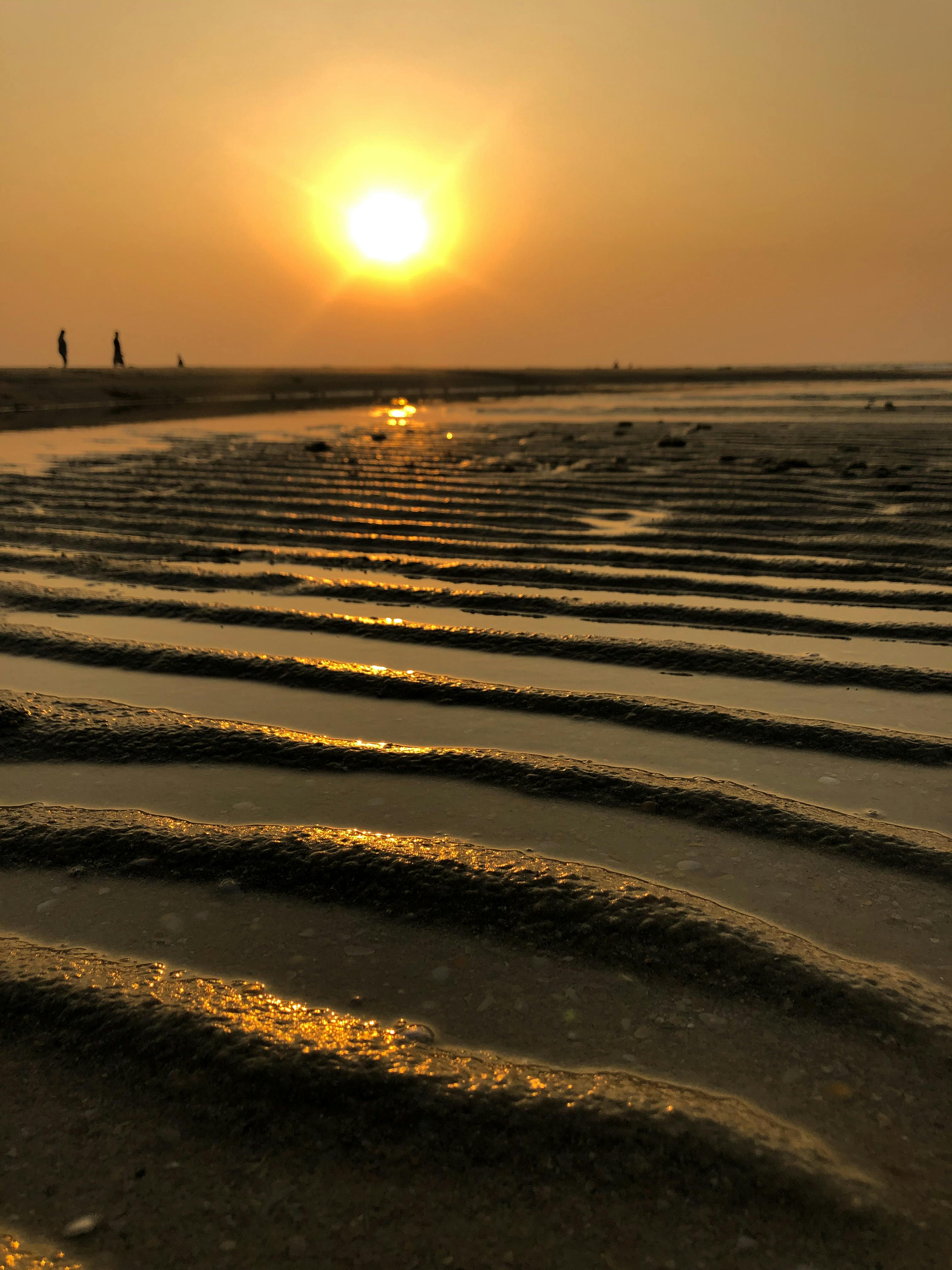 Sand on Beach during Sunset · Free Stock Photo