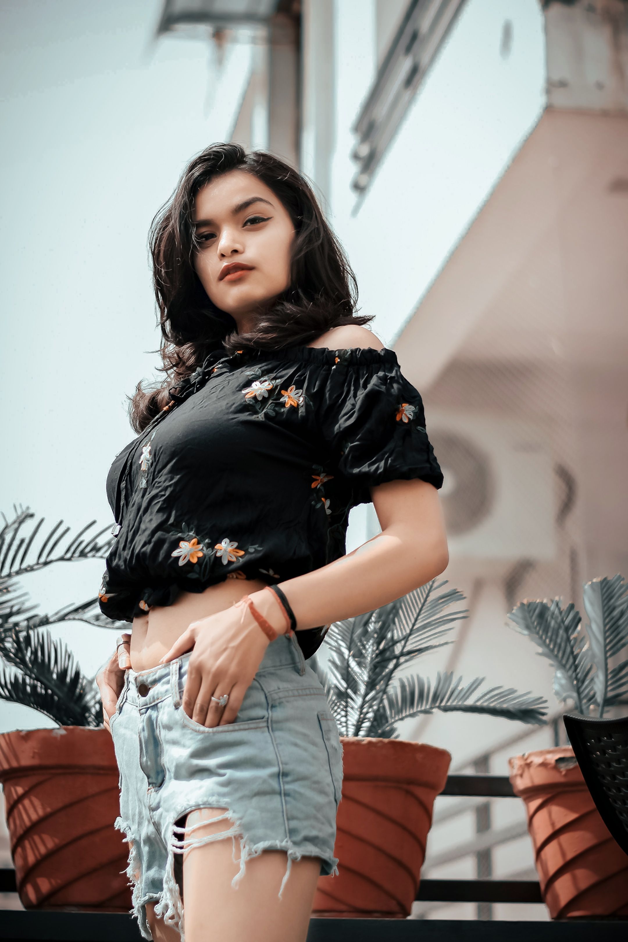 Young Girl Standing in Front of a House · Free Stock Photo